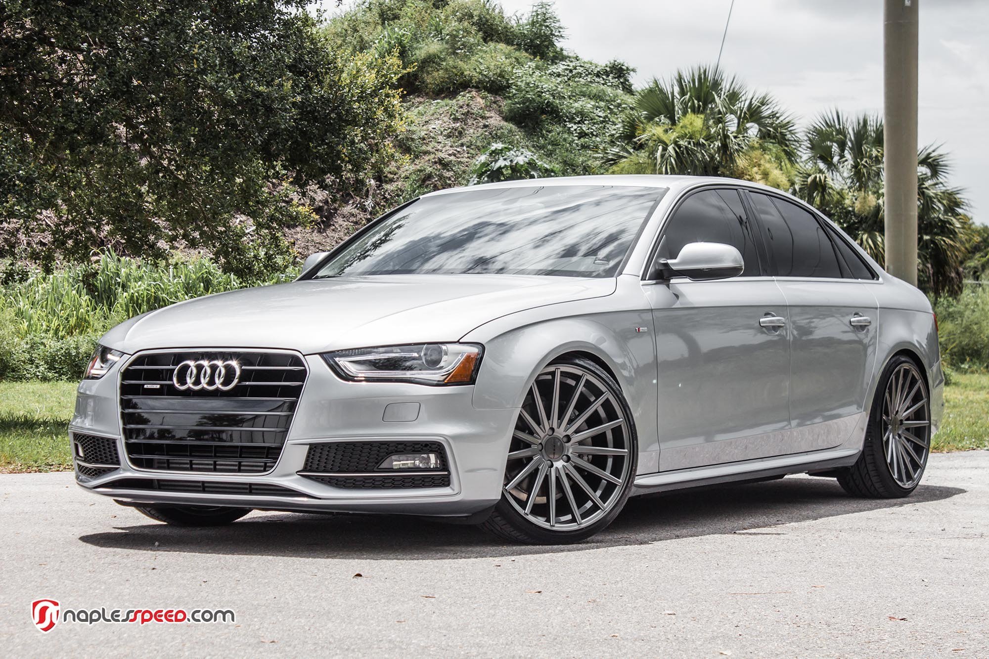 Silver Audi A4 on Color Matched Custom Wheels | CARiD.com Gallery