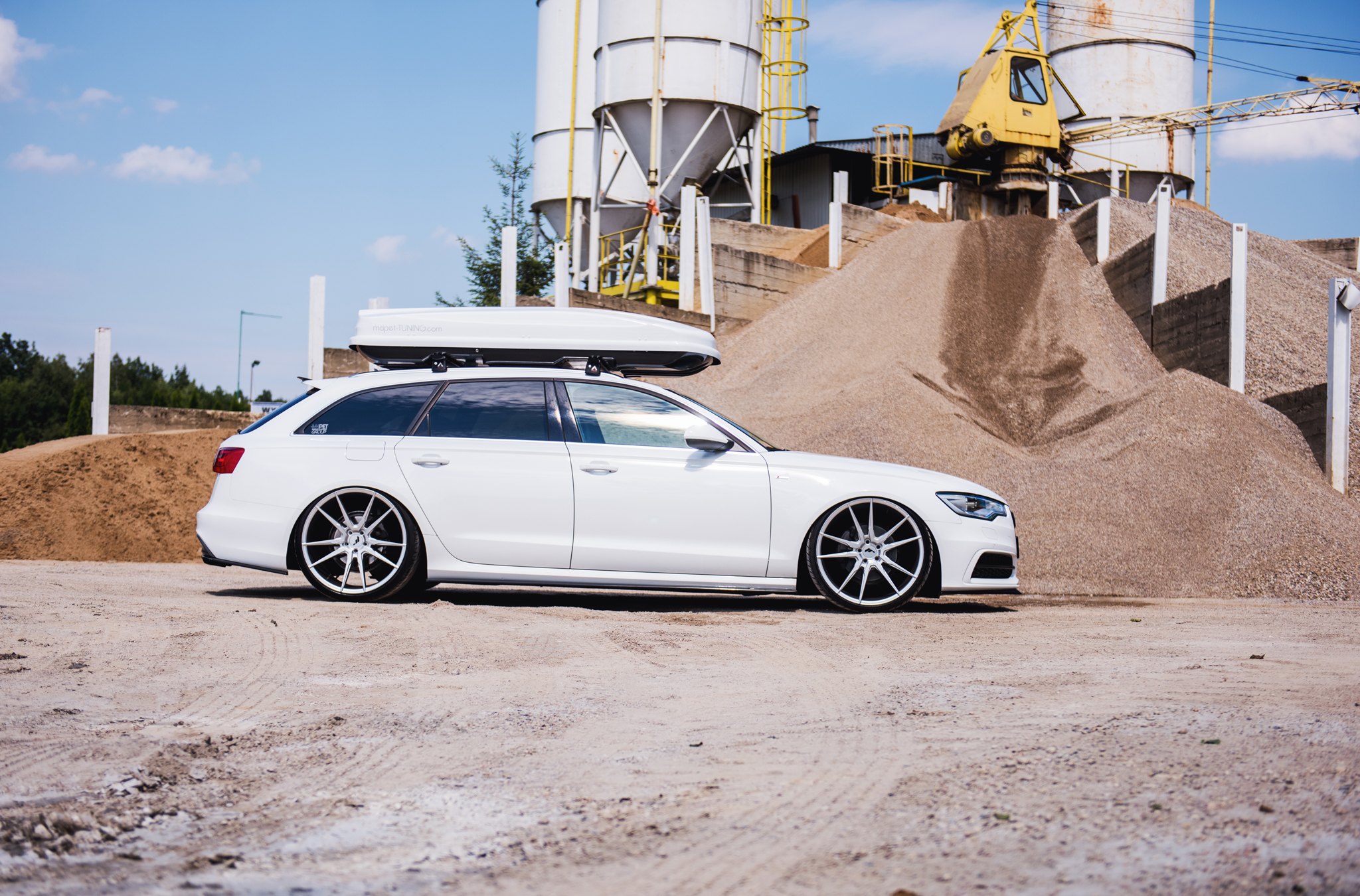 White Audi A6 Outfitted with Custom Roof Rack and Other Add-ons | CARiD ...