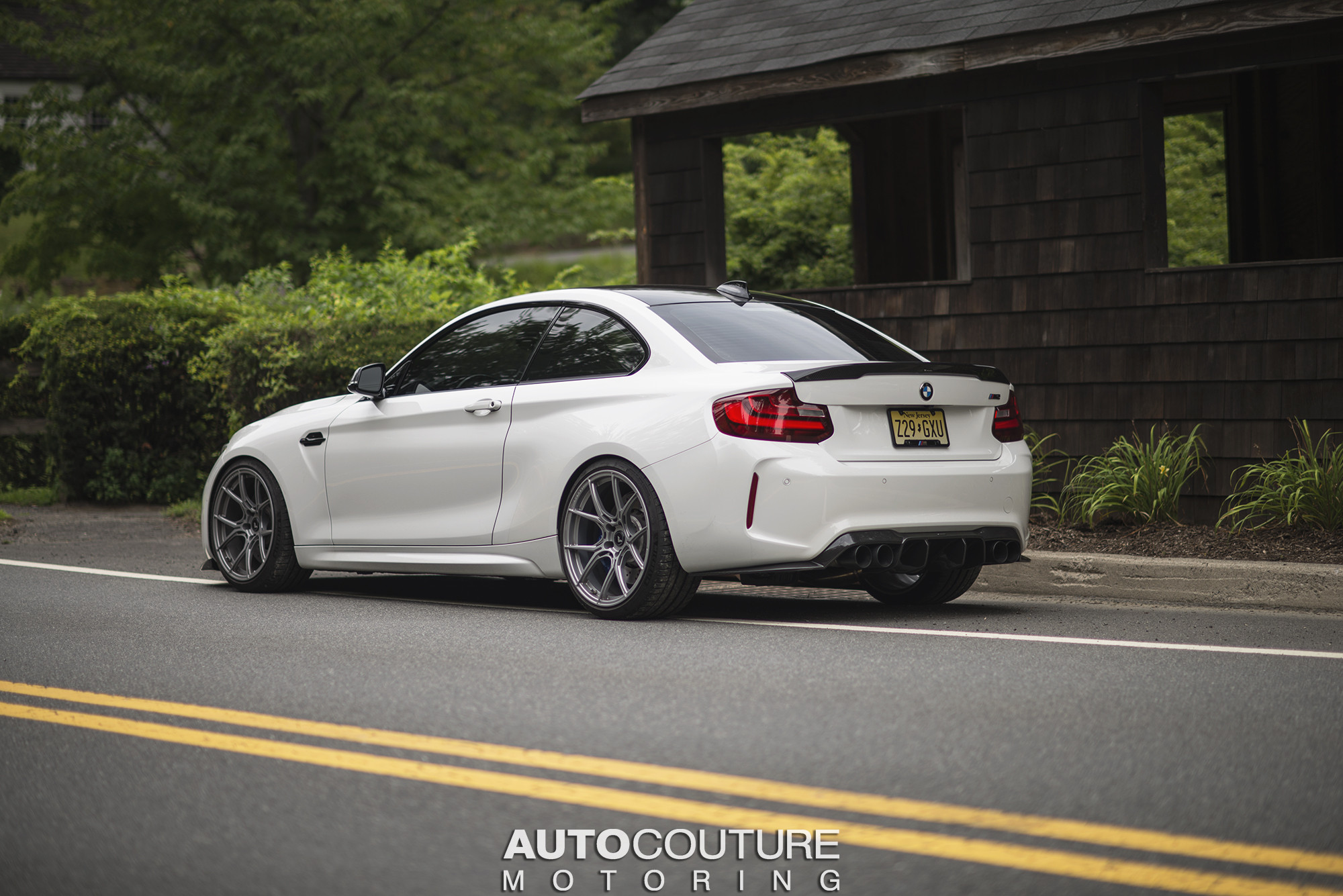Custom White BMW 2-Series Embraced with Carbon Fiber | CARiD.com Gallery