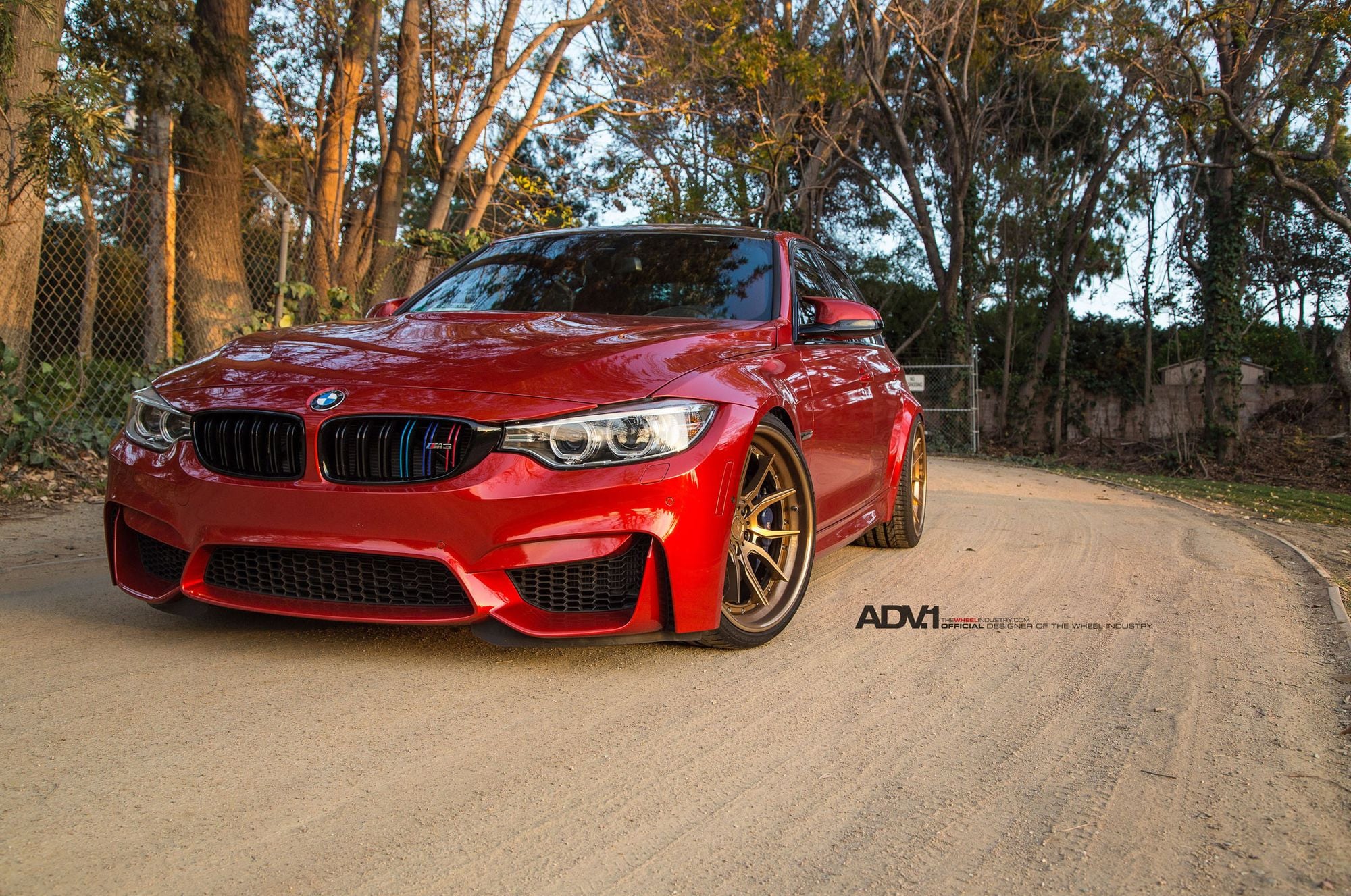 Ruby Red BMW M3 Sedan Equipped With ADV1 Custom Wheels | CARiD.com Gallery