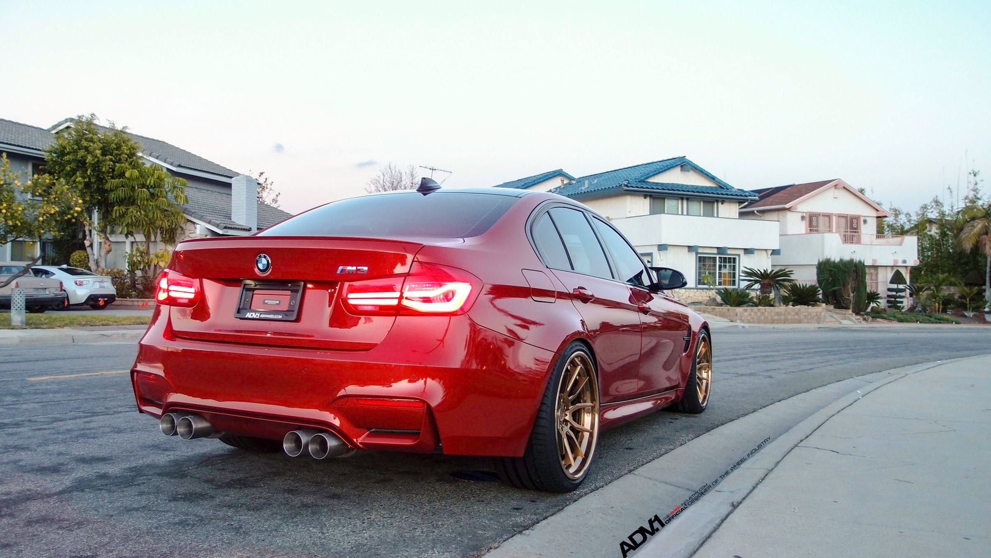 Ruby Red BMW M3 Sedan Equipped With ADV1 Custom Wheels | CARiD.com Gallery