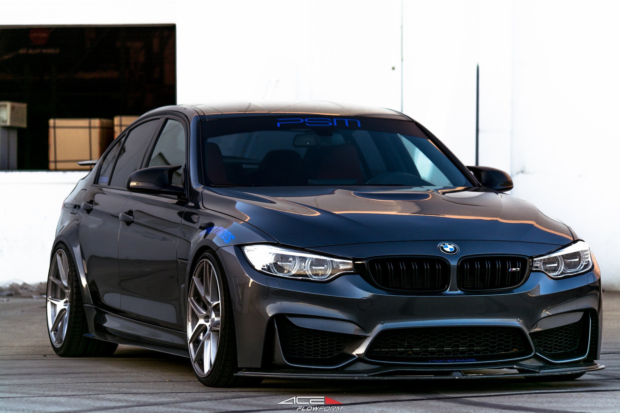 Lowered BMW M3 Sedan With a Front Bumper Splitter | CARiD.com Gallery