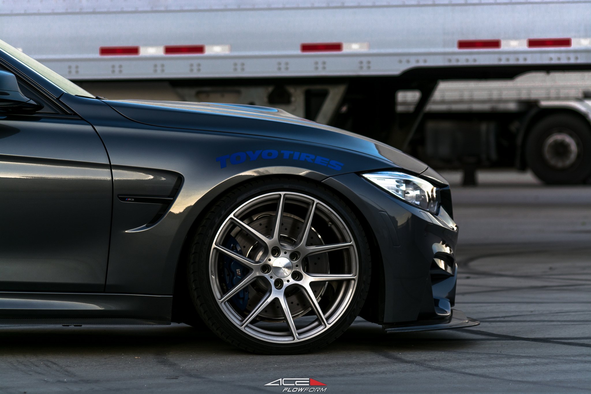 Lowered BMW M3 Sedan With a Front Bumper Splitter | CARiD.com Gallery