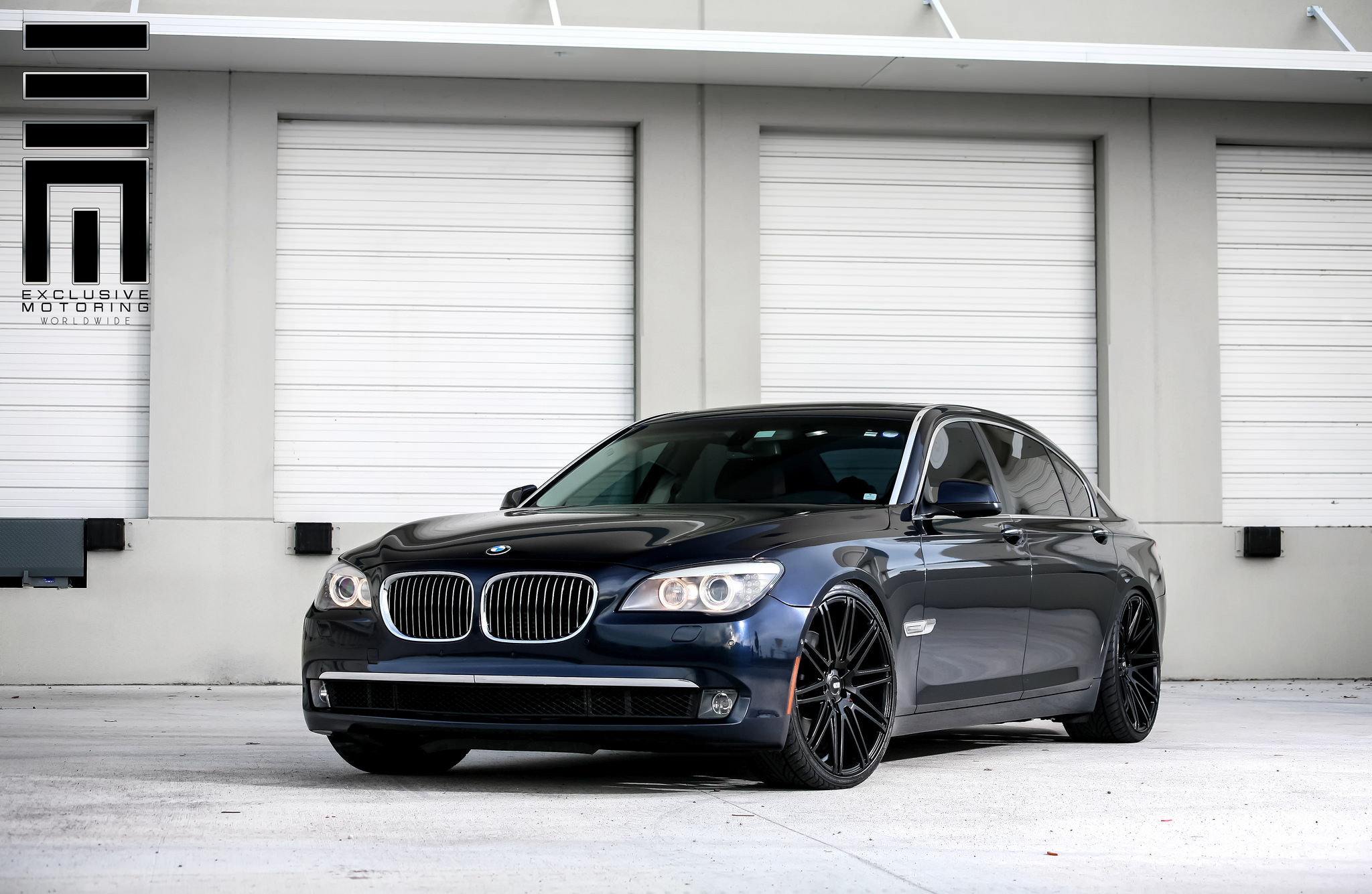 Stylish BMW 750Li on Black Custom Wheels by Exclusive Motoring | CARiD ...
