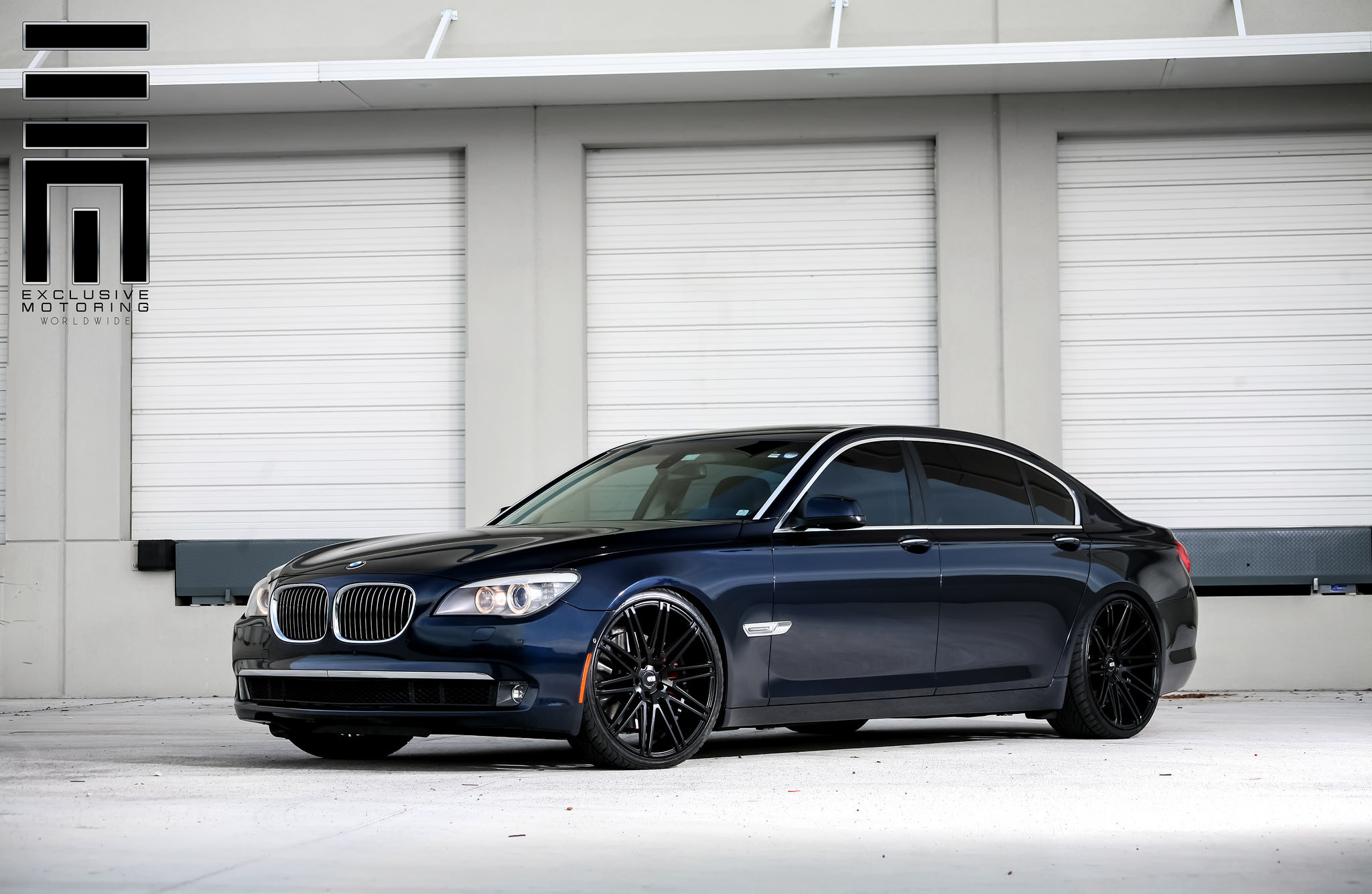 Stylish BMW 750Li on Black Custom Wheels by Exclusive Motoring | CARiD ...