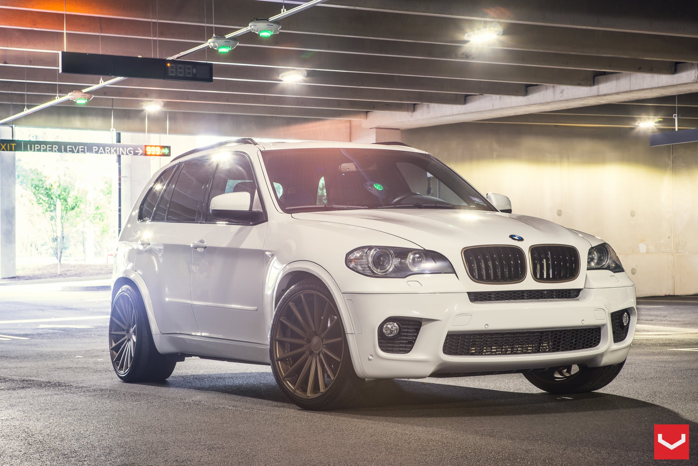 White BMW X5 Featuring Boosted Lighting and Custom Wheels | CARiD.com ...