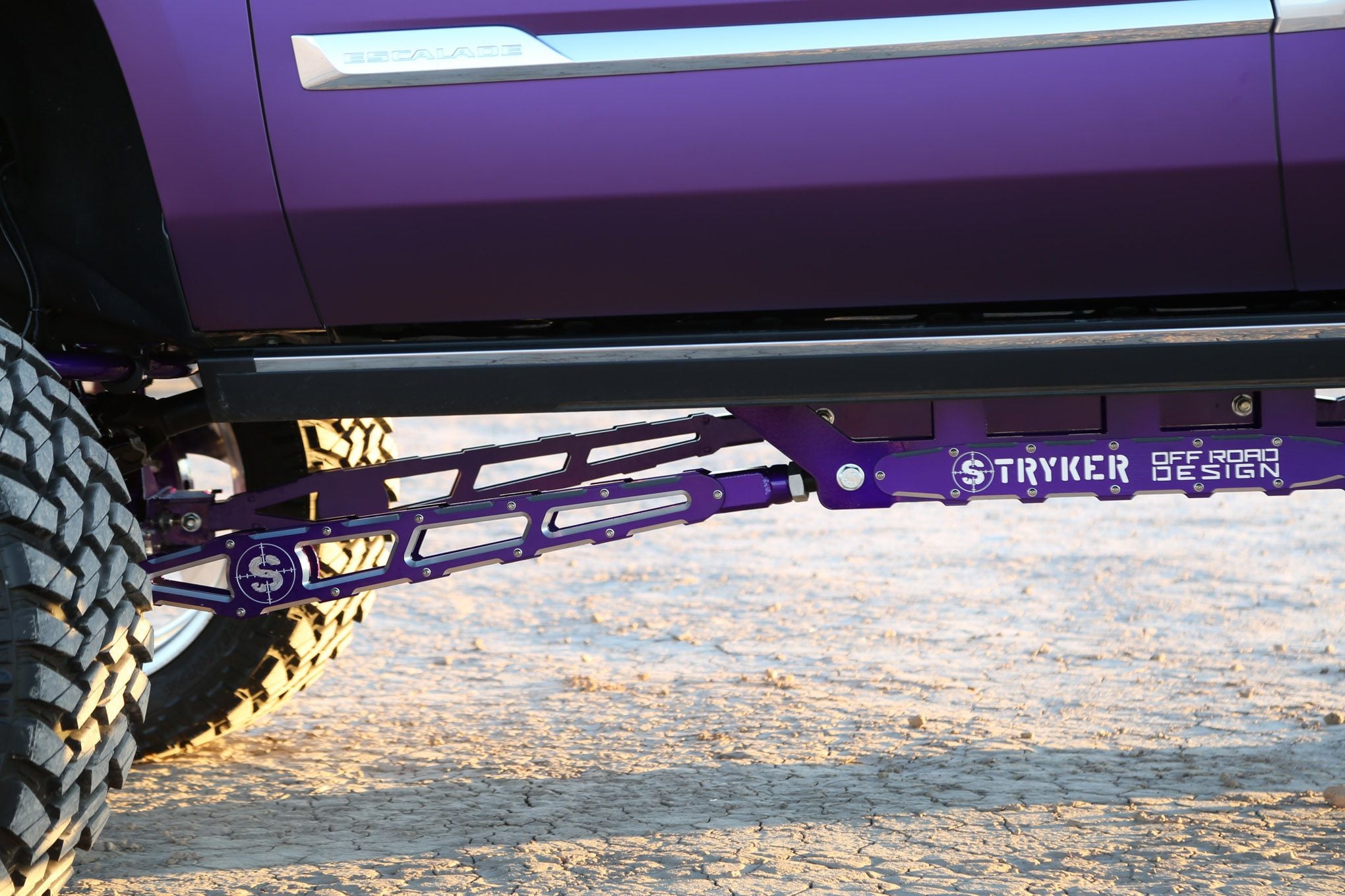 Crazy Big Lift on Custom Matte Purple Cadillac Escalade | CARiD.com Gallery