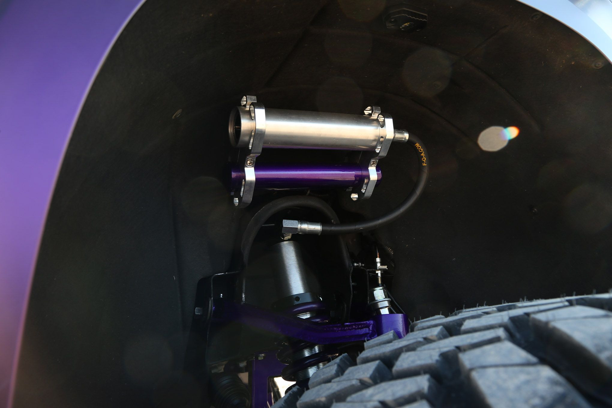 Crazy Big Lift on Custom Matte Purple Cadillac Escalade | CARiD.com Gallery