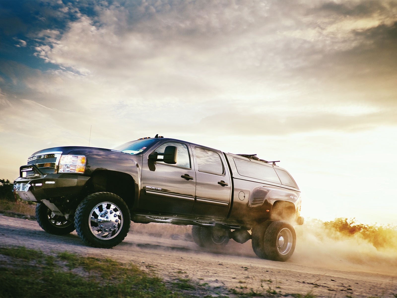 3500HD Dually With a Camper Shell and Large Tires | CARiD.com Gallery