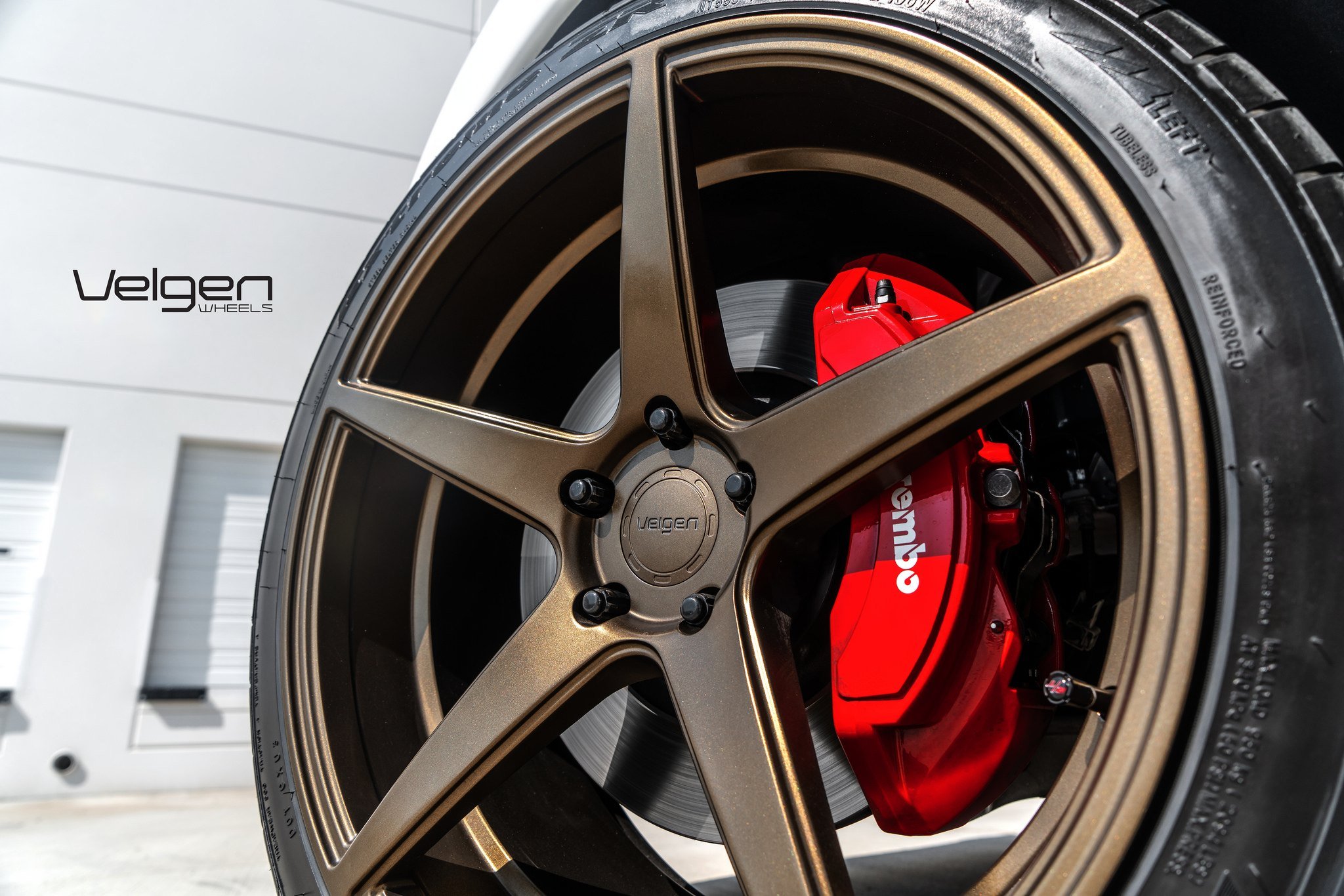 White Dodge Durango Outfitted with Bronze Strips and Bronze Velgen Rims ...