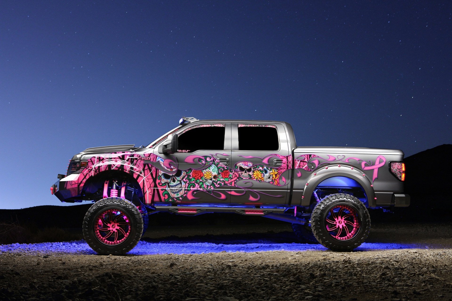 F150 With a Massive Lift and Crazy Pink Graphics | CARiD.com Gallery