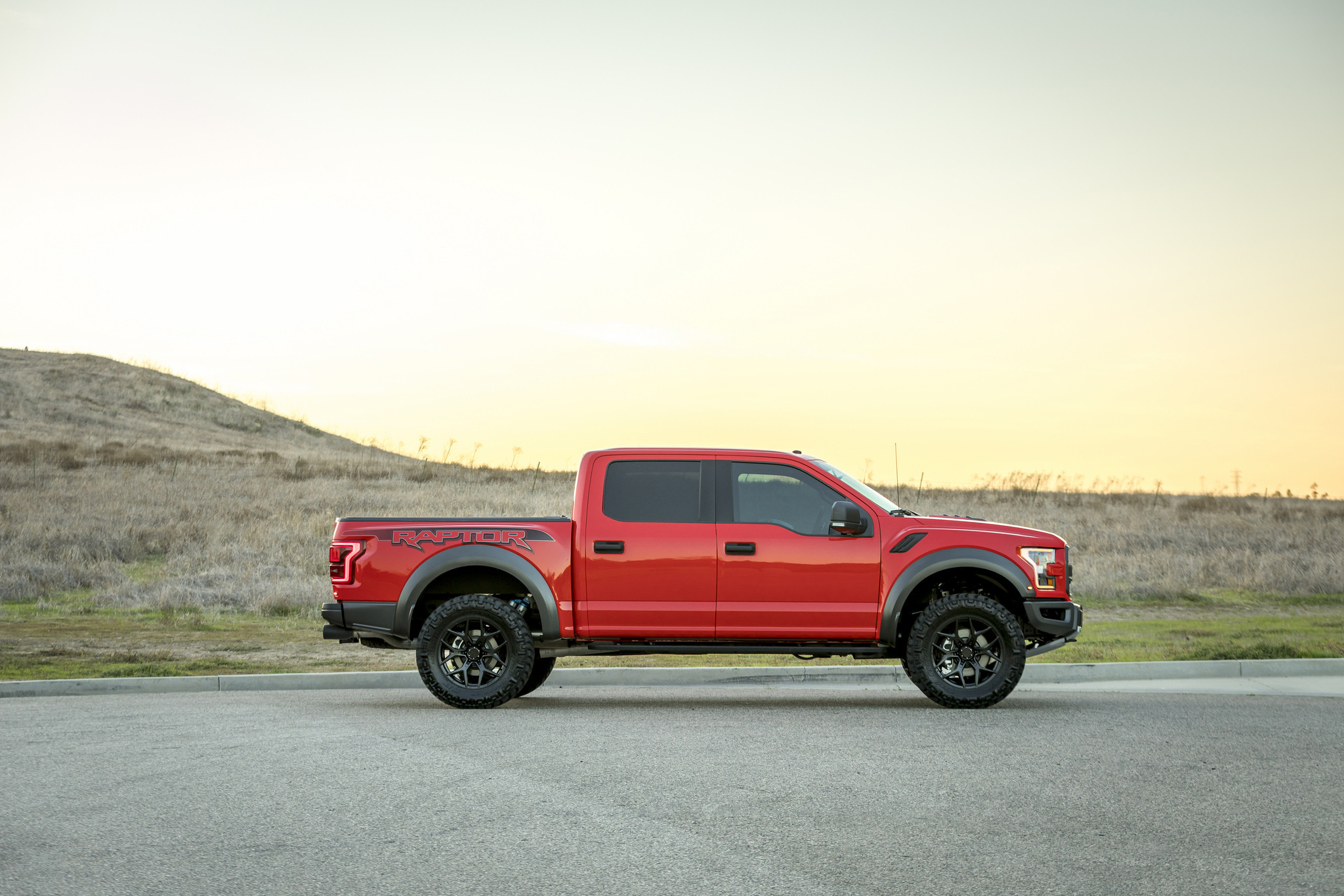 Matte Black Vorsteiner Wheels Enhancing Red Ford F-150 | CARiD.com Gallery