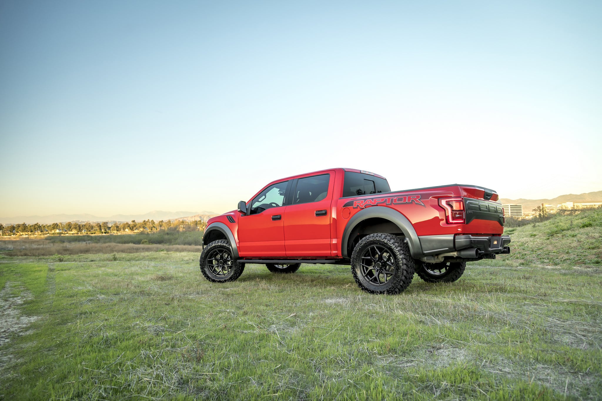 Matte Black Vorsteiner Wheels Enhancing Red Ford F-150 | CARiD.com Gallery
