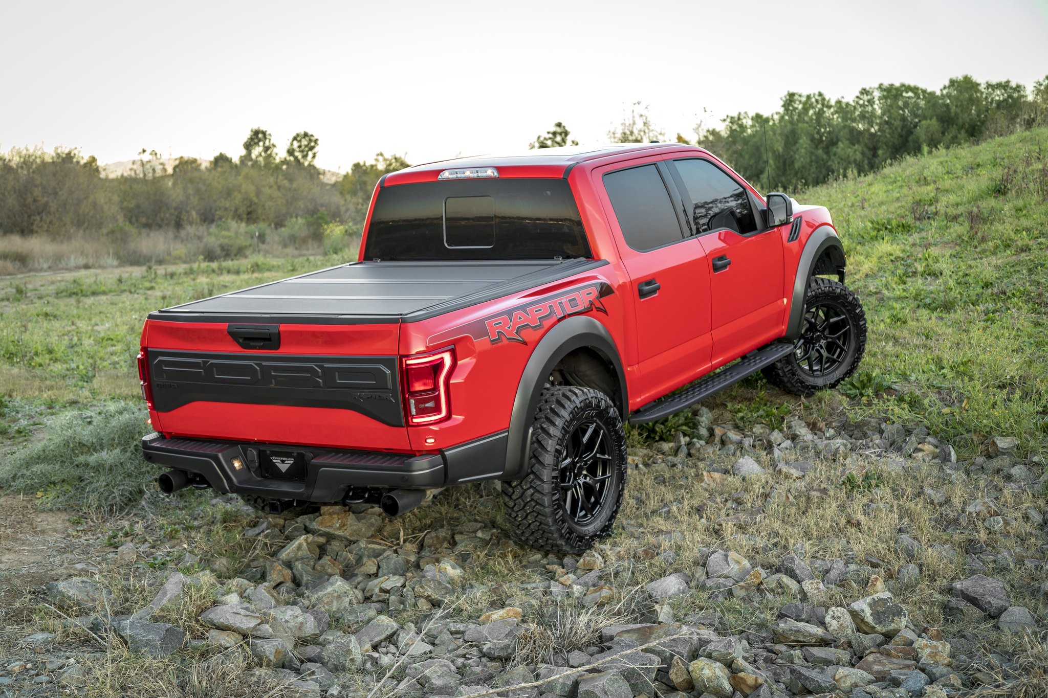 Matte Black Vorsteiner Wheels Enhancing Red Ford F-150 | CARiD.com Gallery