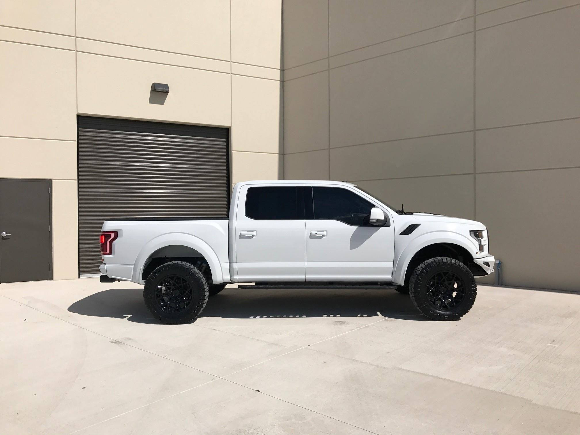 White Lifted Ford F-150 Boasts Contrasting Black Additions | CARiD.com ...