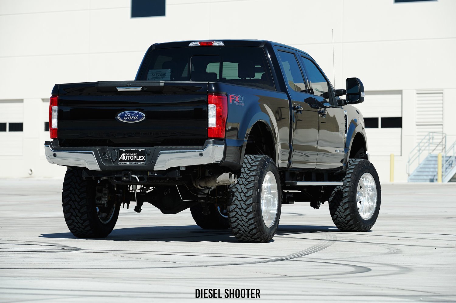 Imposing Black Ford F-350 on Chrome Custom Rims | CARiD.com Gallery