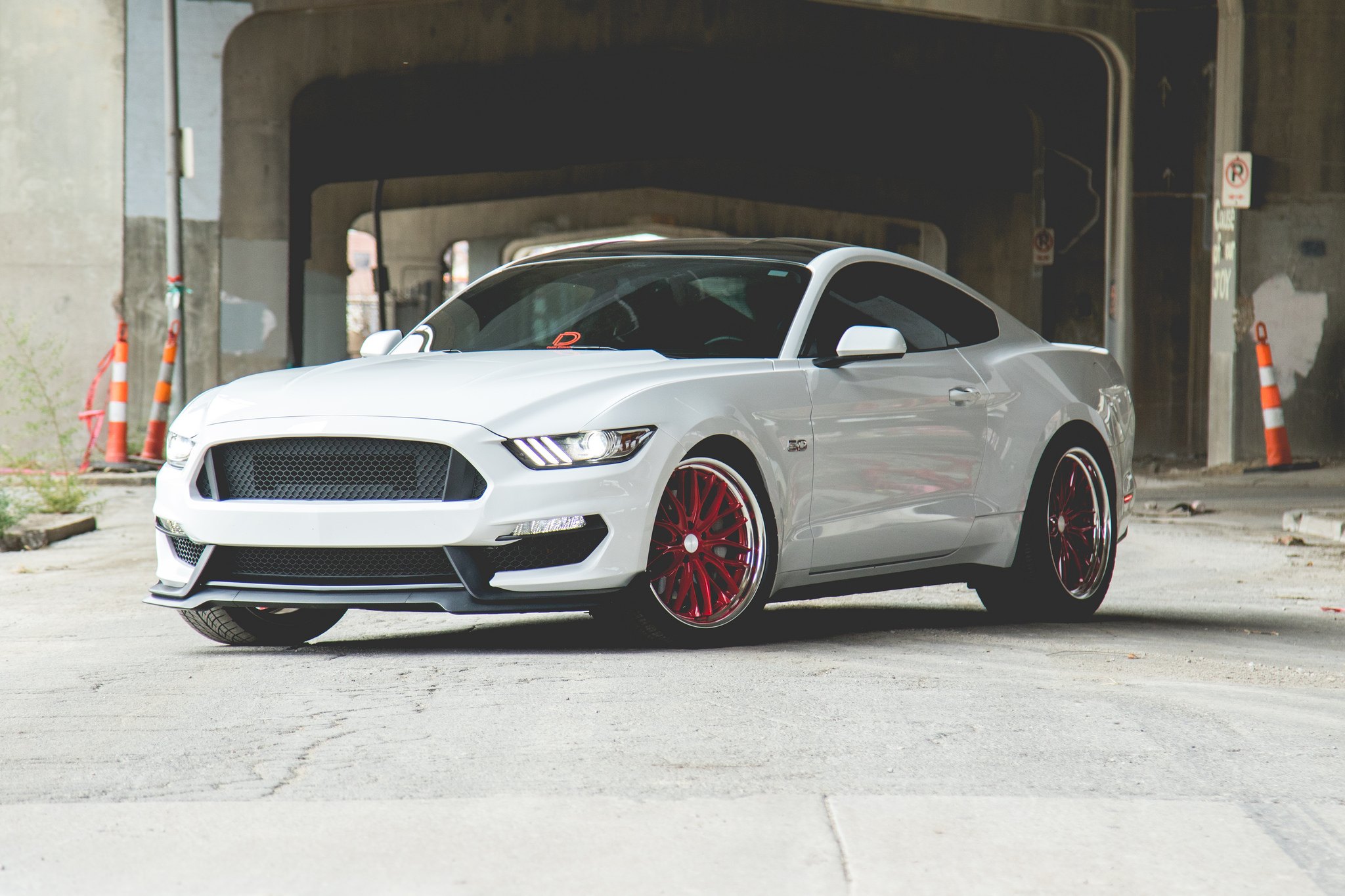 Striking Contrast: Custom Red Vossen Wheels on White Ford Mustang ...