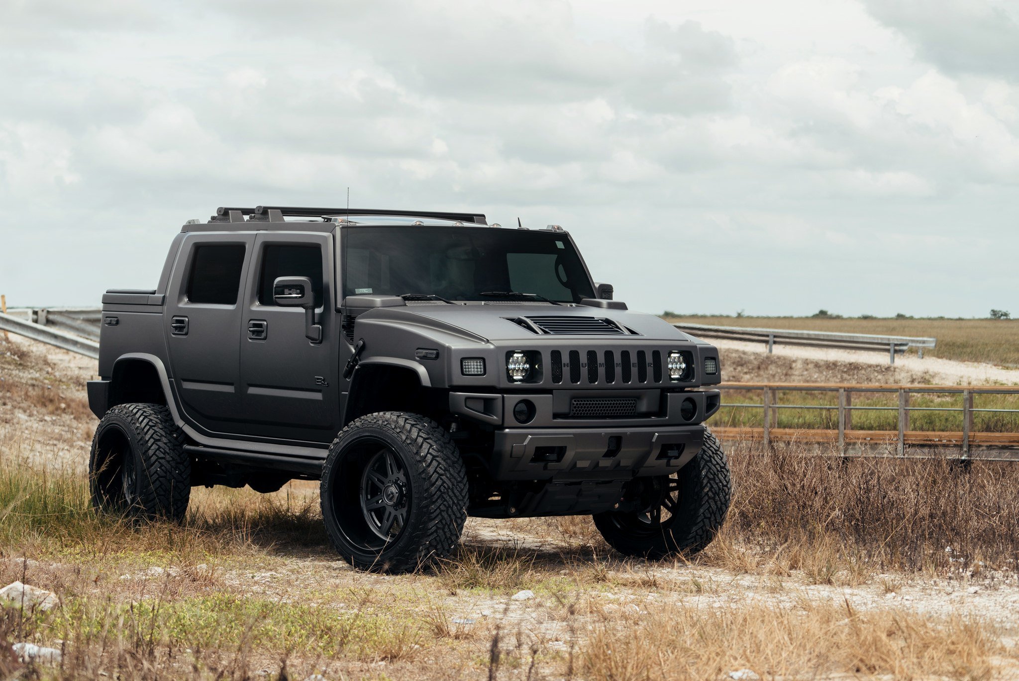 Mean-looking Hummer H2 SUT With a Lift and Fuel Off-road Wheels | CARiD ...