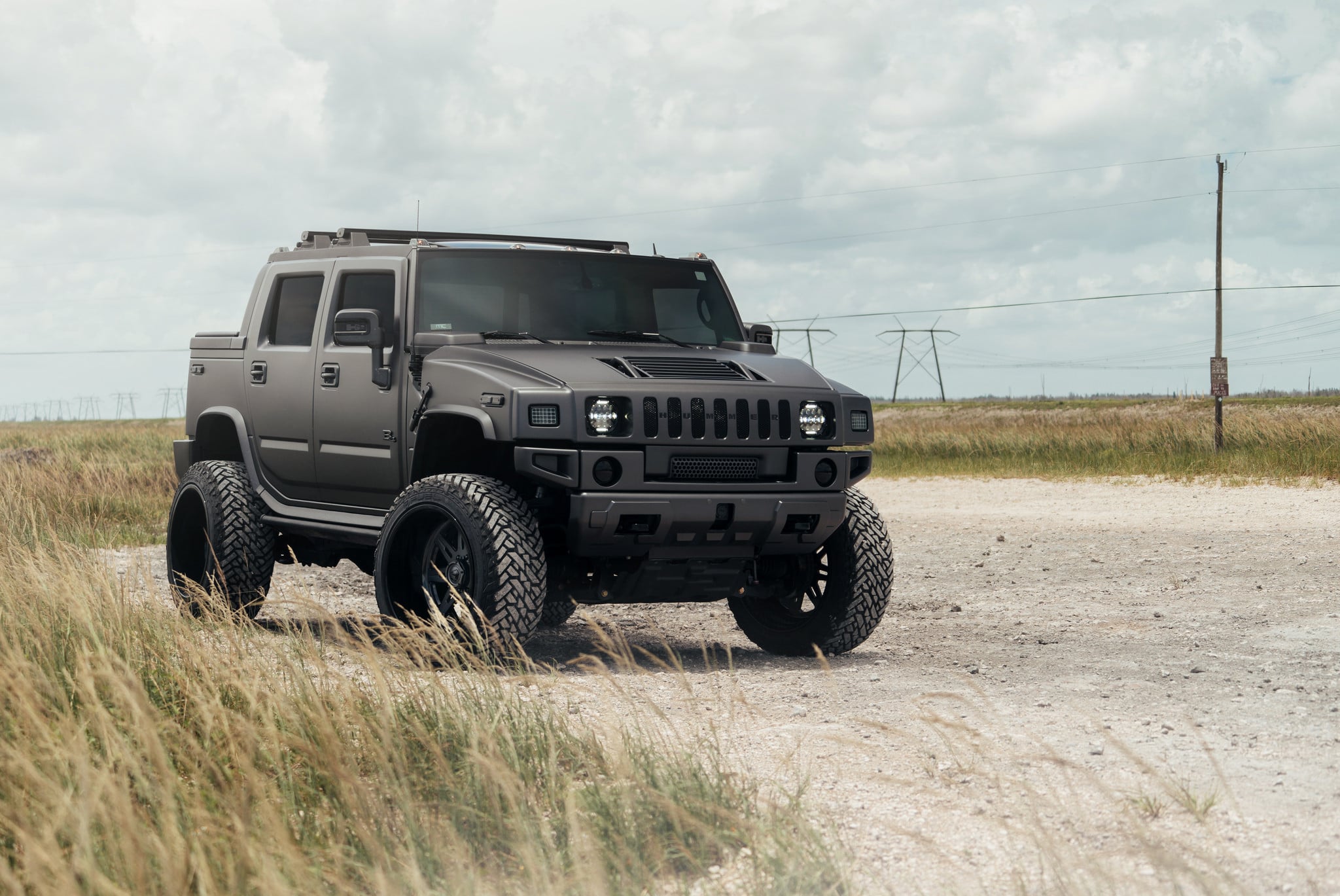 Mean-looking Hummer H2 SUT With a Lift and Fuel Off-road Wheels | CARiD ...