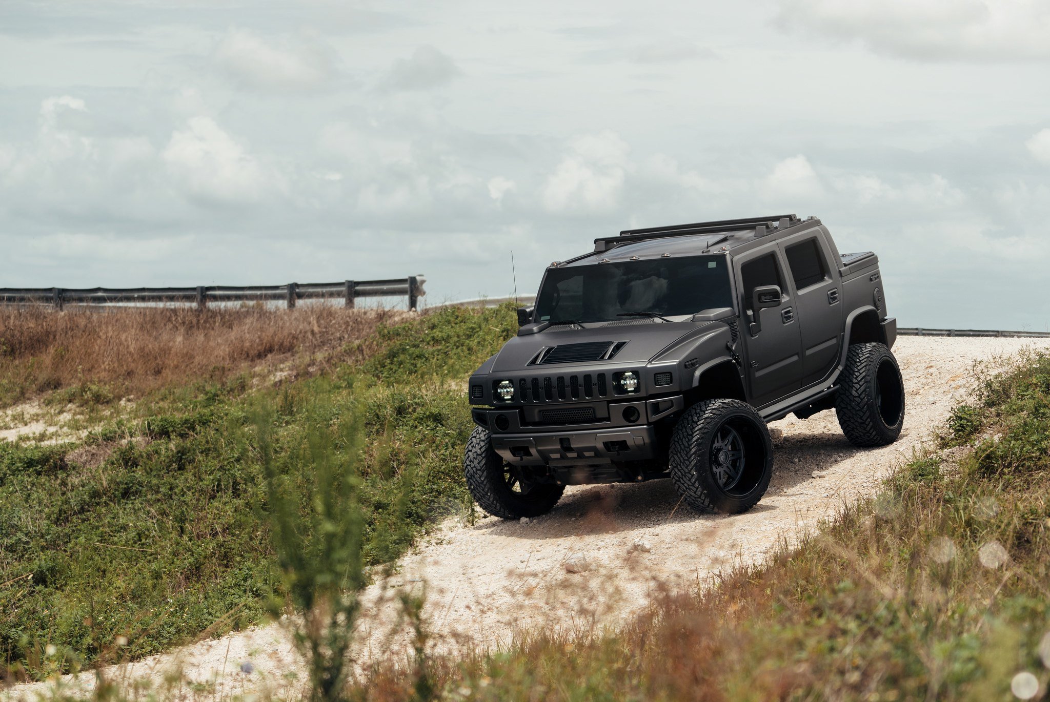 Mean-looking Hummer H2 SUT With a Lift and Fuel Off-road Wheels | CARiD ...