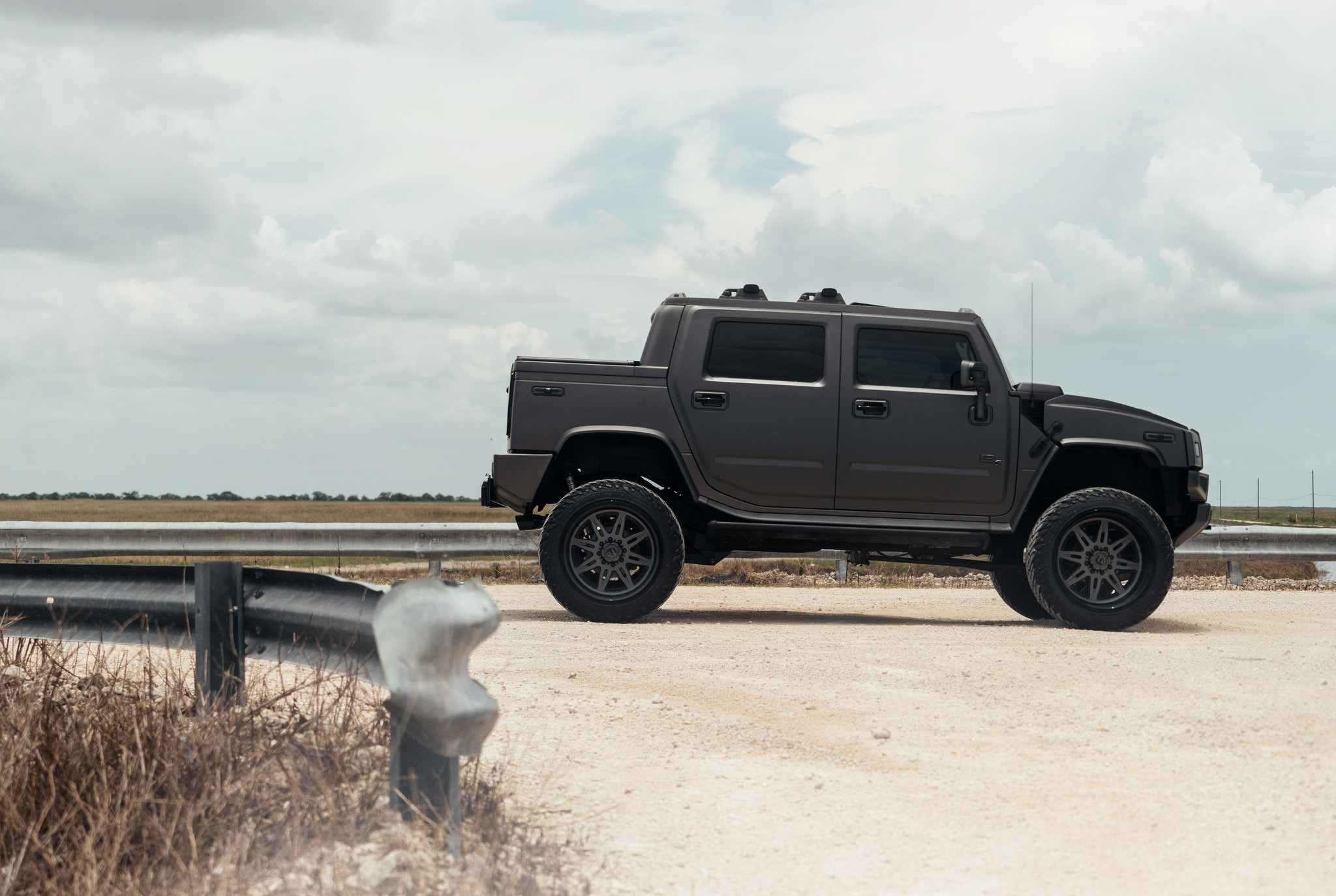 Mean-looking Hummer H2 SUT With a Lift and Fuel Off-road Wheels | CARiD ...