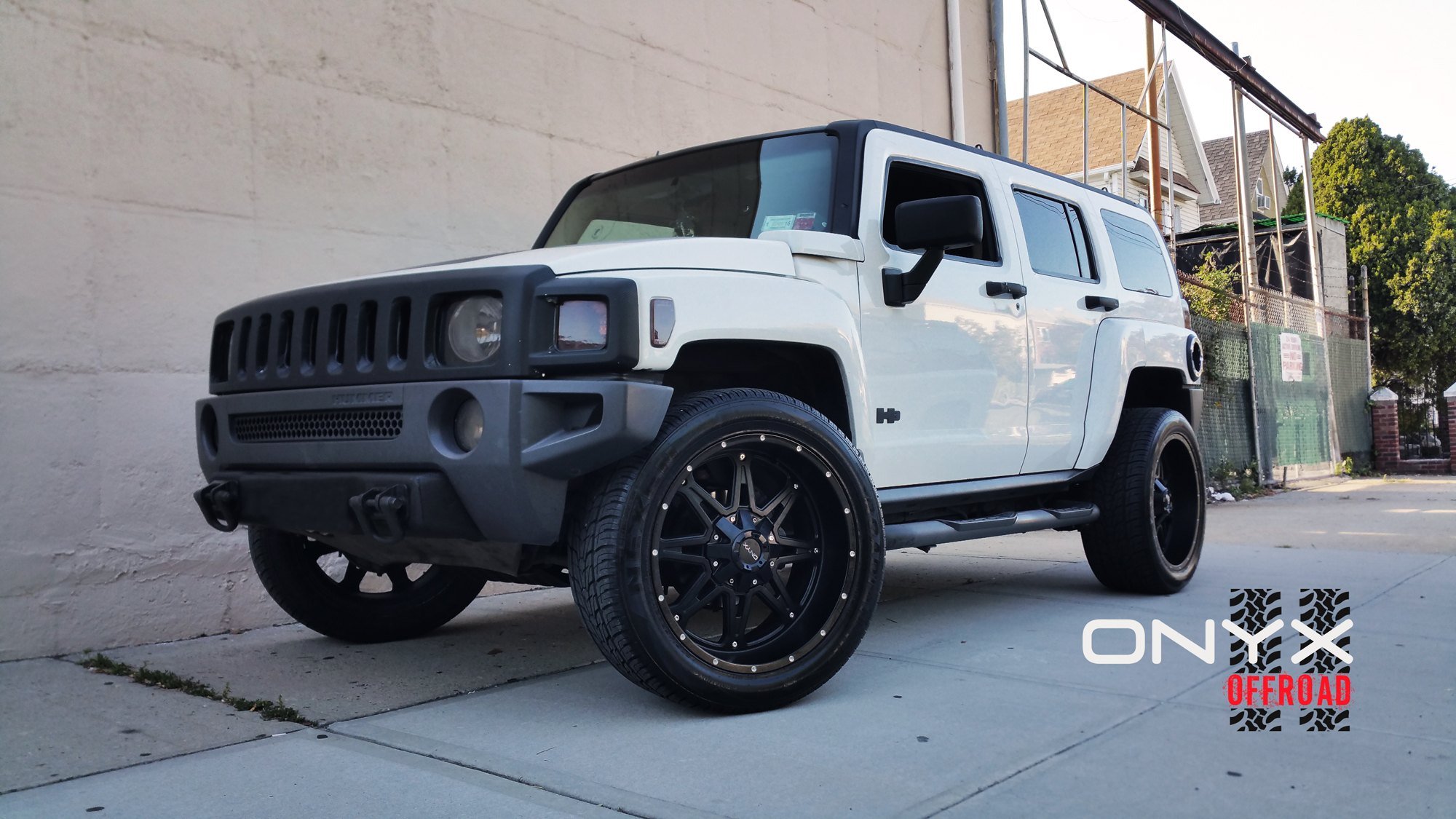 Royal White Hummer H3 Wearing Gloss Black Onyx Wheels | CARiD.com Gallery