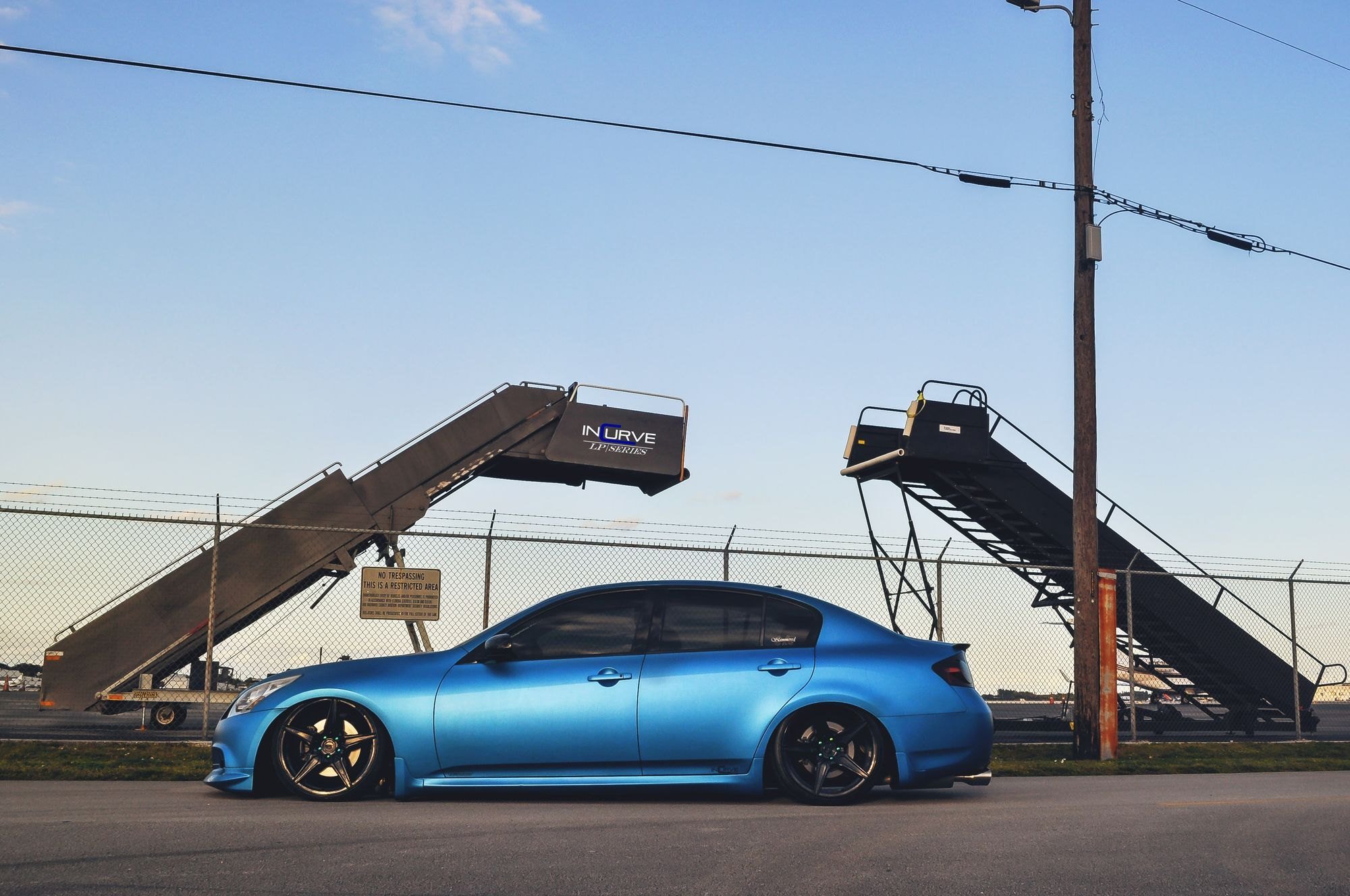 Lower Standards: Stanced Blue Infiniti G35 | CARiD.com Gallery