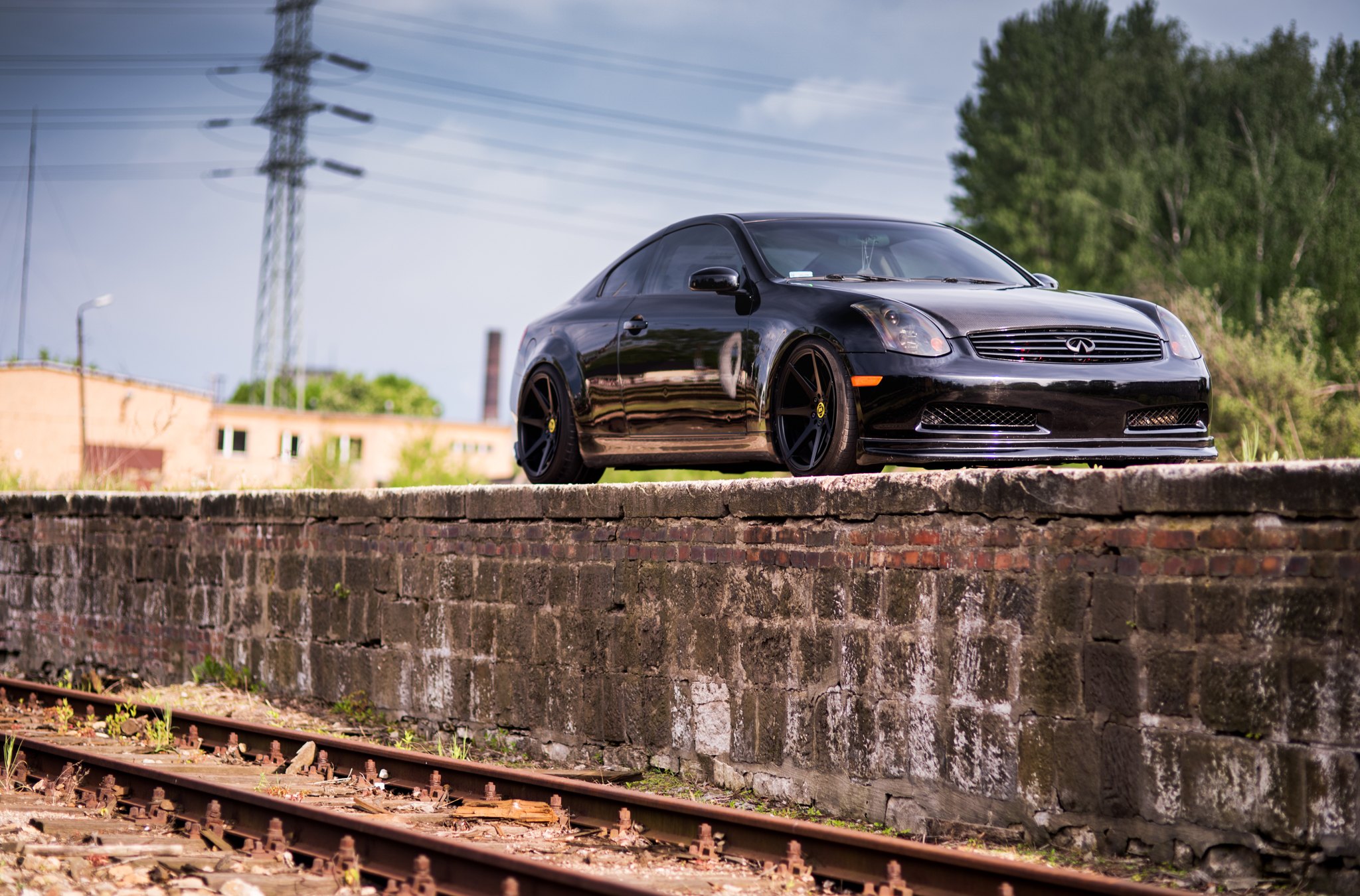 Showy Black Infiniti G35 on JR Rims with Yellow Brakes | CARiD.com Gallery
