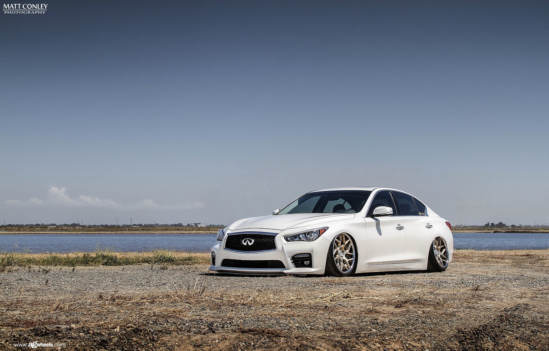 JDM Fan Dream: White Infiniti Q50 Stanced Out | CARiD.com Gallery