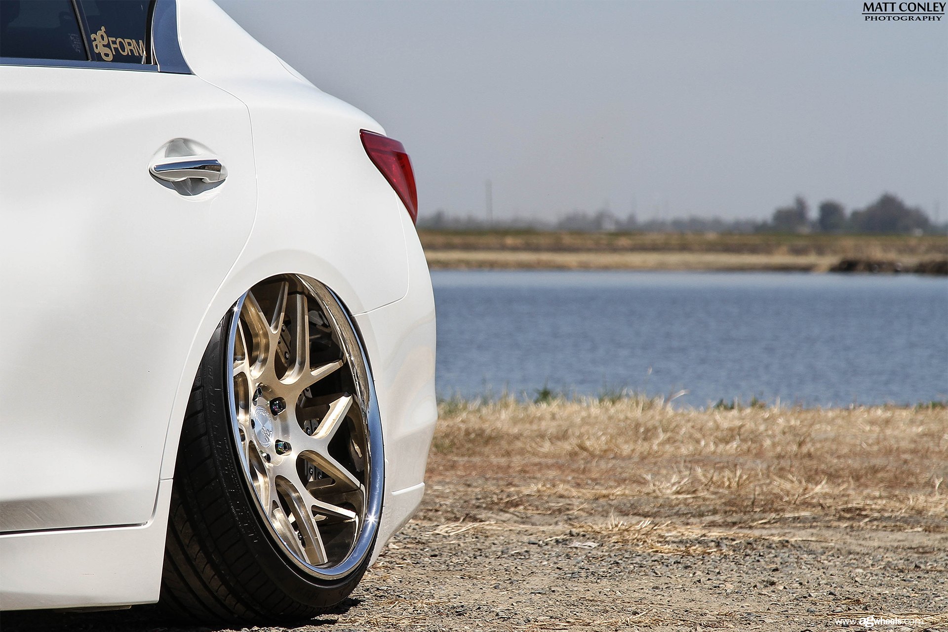JDM Fan Dream: White Infiniti Q50 Stanced Out | CARiD.com Gallery