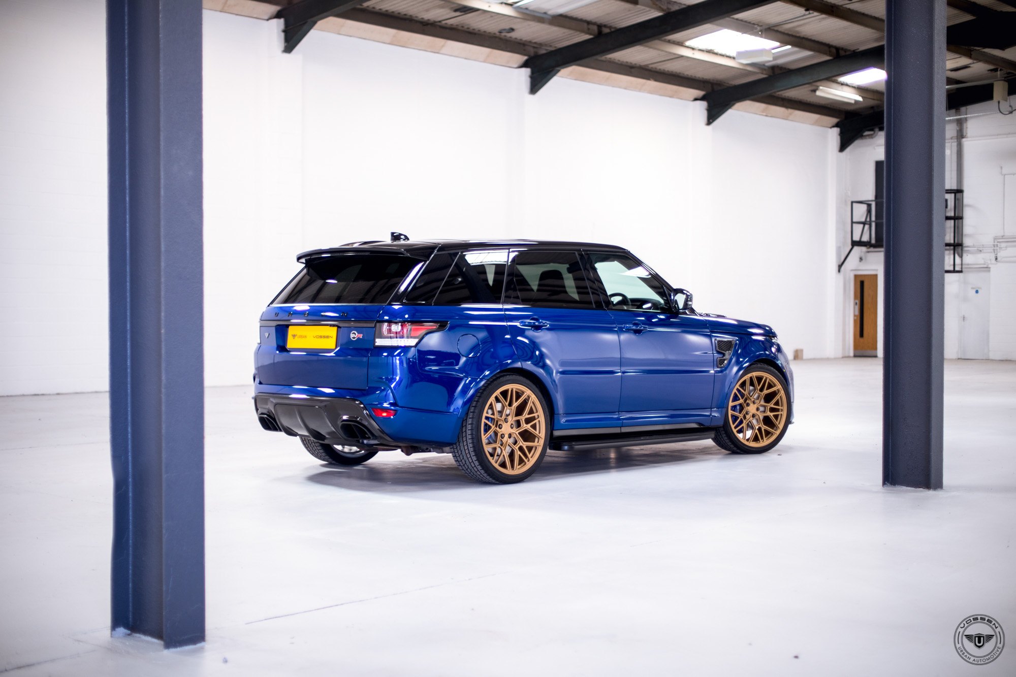 Satin Gold Vossen Wheels Adorning Blue Range Rover Sport | CARiD.com ...