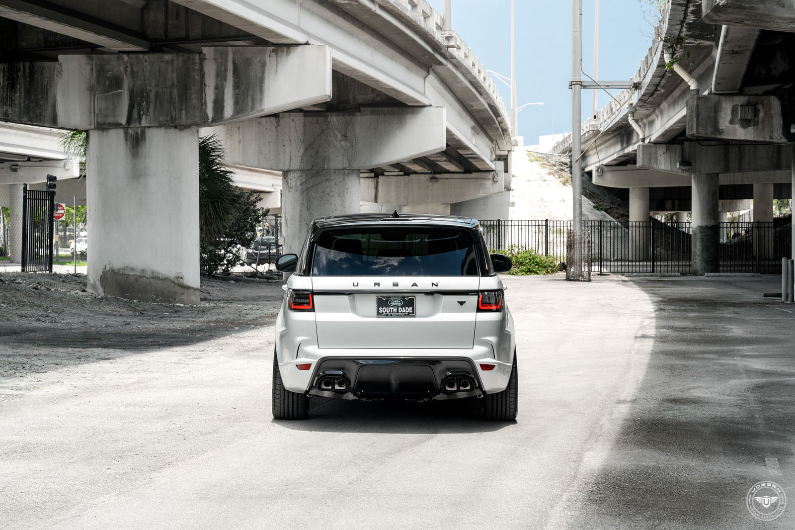 White Range Rover Highlighted by Distinctive Black Accents and Custom ...