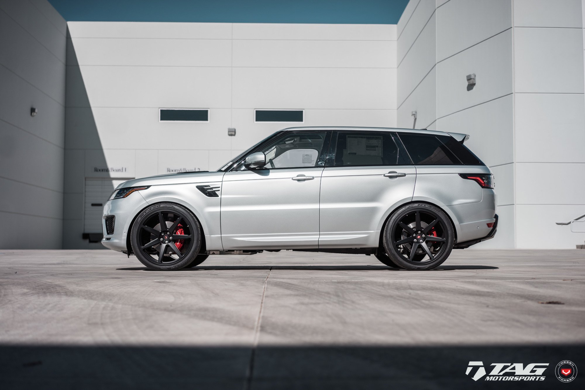 White Range Rover Sport with Stylish Blcked Out Accents | CARiD.com Gallery