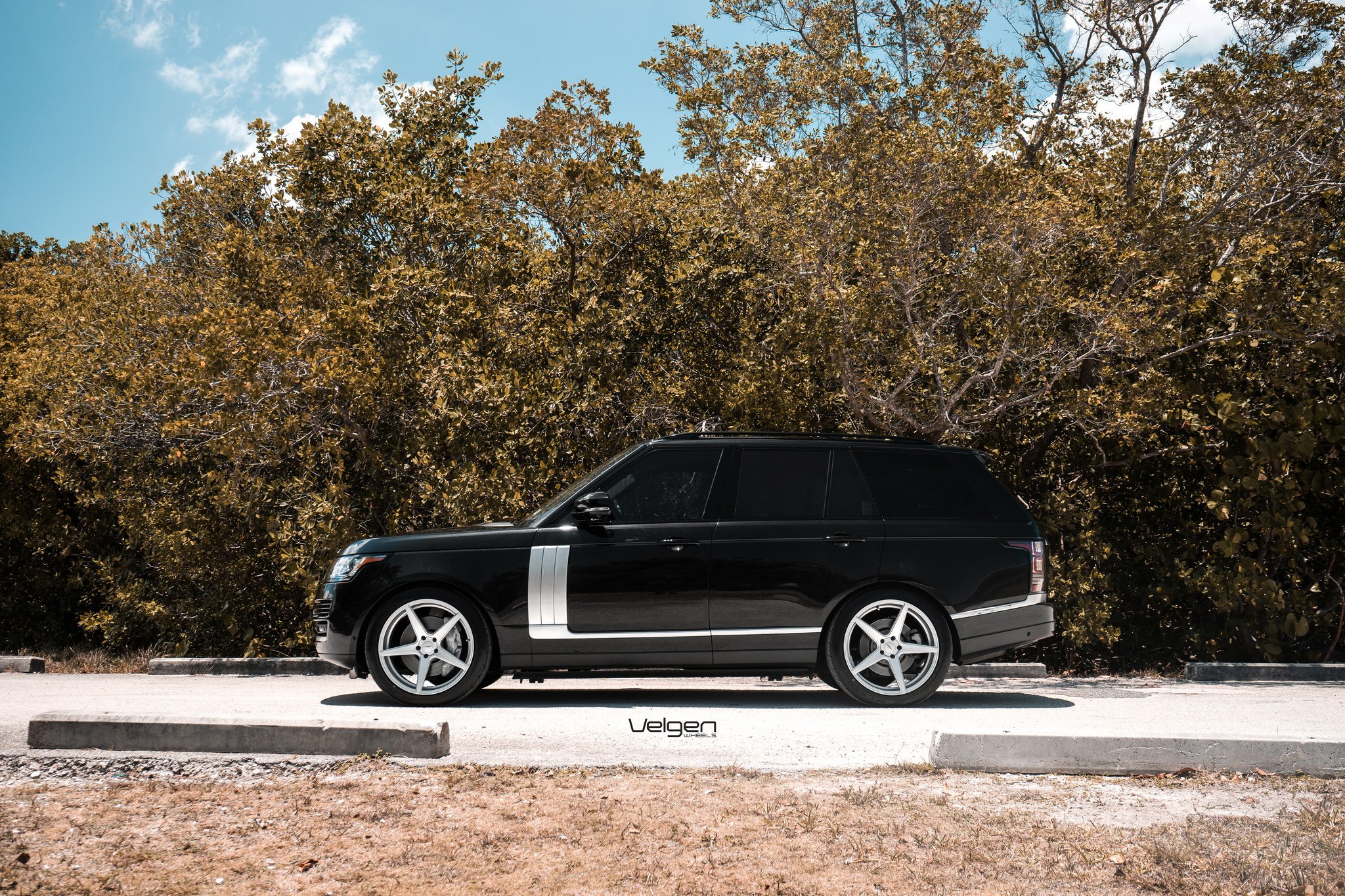 Chrome Mode on: Custom Black Range Rover | CARiD.com Gallery