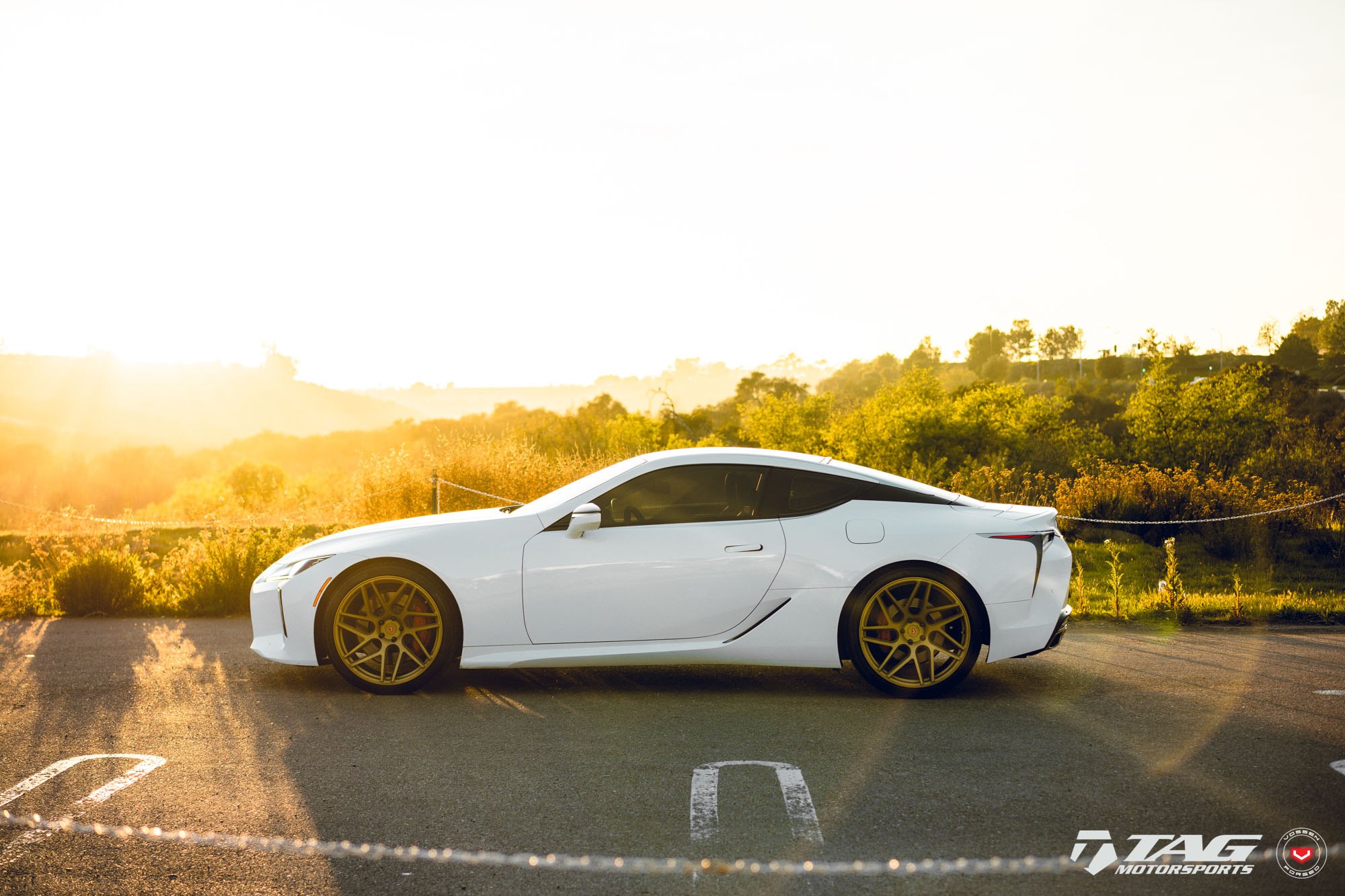 Gold Matter: Forged Vossen Rims Adorning White Lexus LC | CARiD.com Gallery