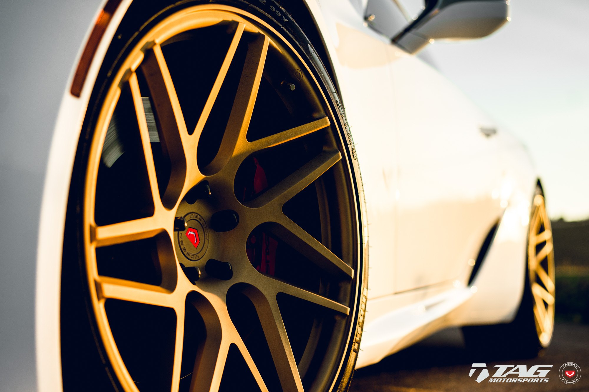 Gold Matter: Forged Vossen Rims Adorning White Lexus LC | CARiD.com Gallery