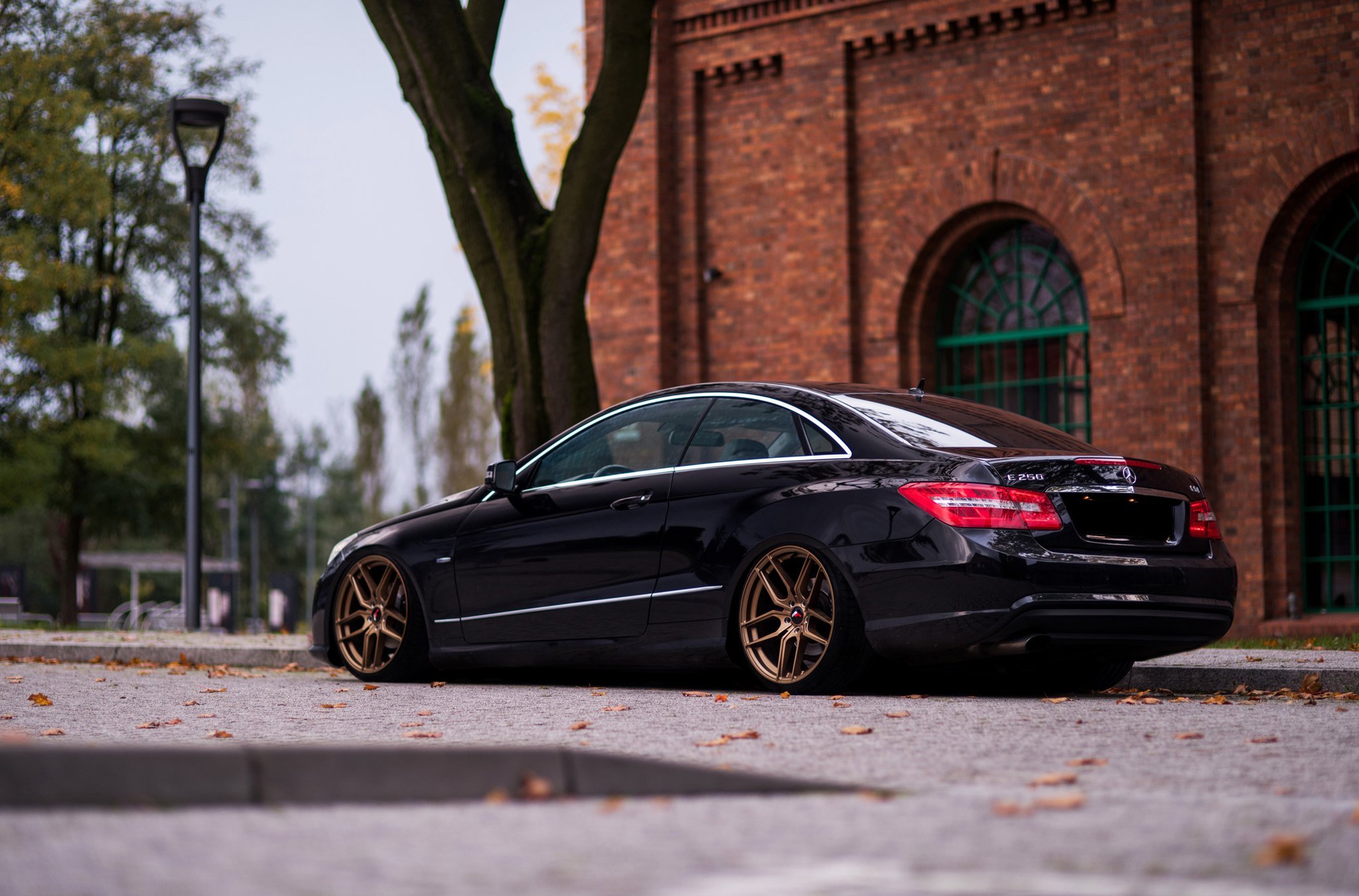 Black Mercedes E Class Rolling on Bronze JR Wheels | CARiD.com Gallery