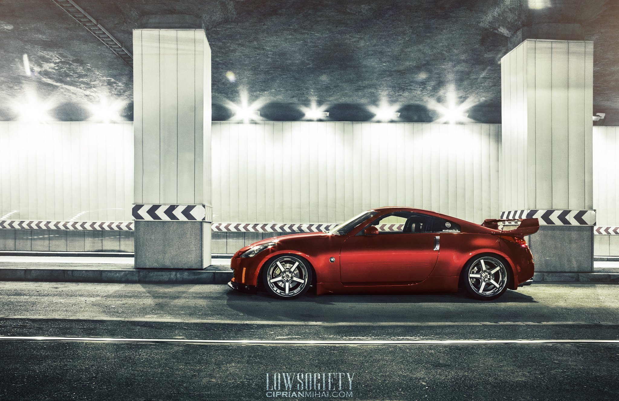 Modified Red Nissan 350Z Driving Low | CARiD.com Gallery
