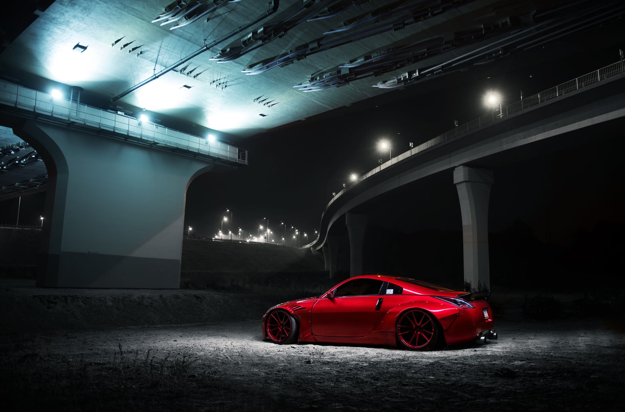 Red Nissan 350Z Boasting Red Buttoms and Liberty Walk Body Kit | CARiD ...