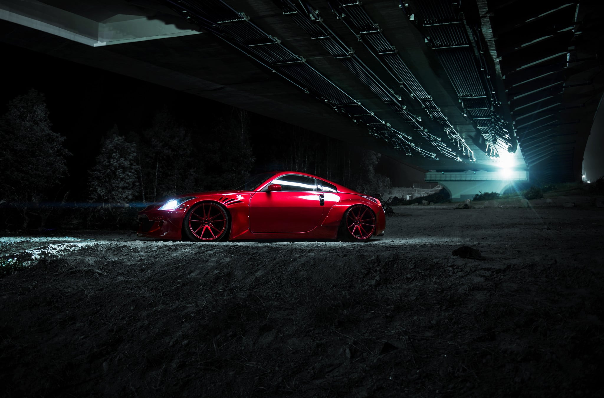Red Nissan 350Z Boasting Red Buttoms and Liberty Walk Body Kit | CARiD ...