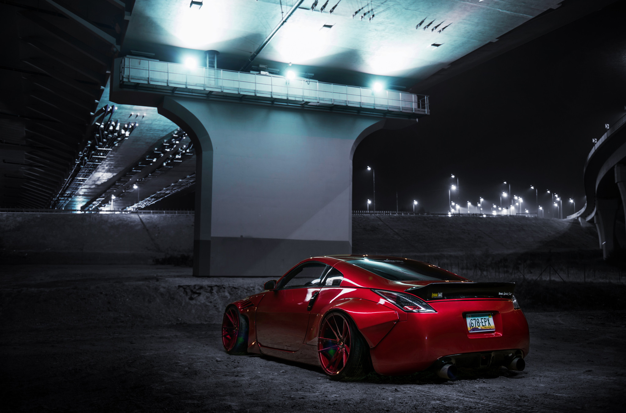 Red Nissan 350Z Boasting Red Buttoms and Liberty Walk Body Kit | CARiD ...