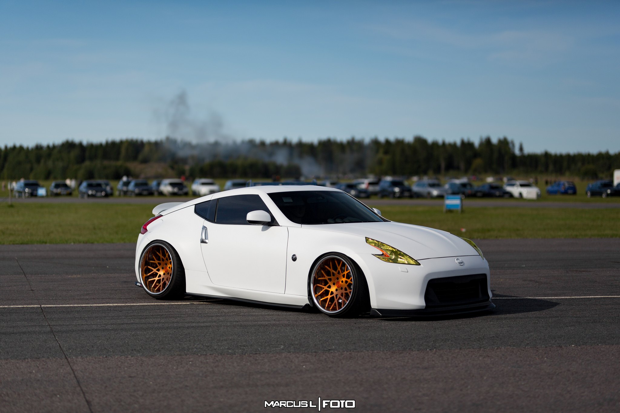 Slammed 370Z With Euro-Style Yellow Headlights | CARiD.com Gallery