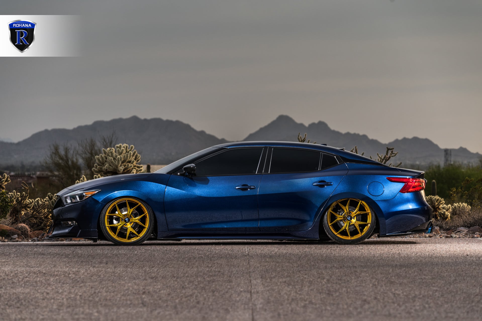 Gold Rohana Wheels Add a Touch of Luxury to Blue Nissan Maxima | CARiD ...