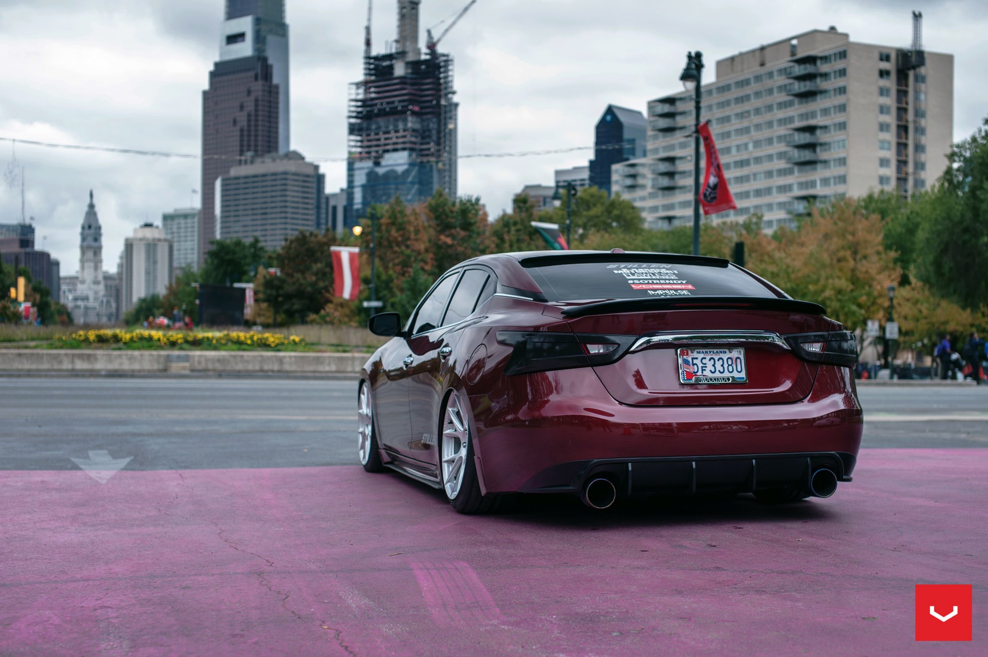 Air Lifted Nissan Maxima With Dual Exhaust and Front Bumper Lip | CARiD ...