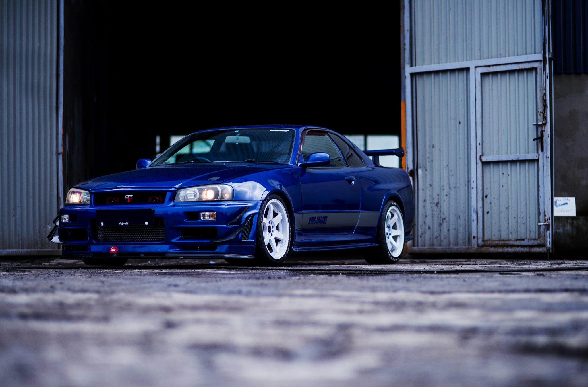 Blue Nissan Skyline Wearing an Impressive Large Wing Spoiler | CARiD ...