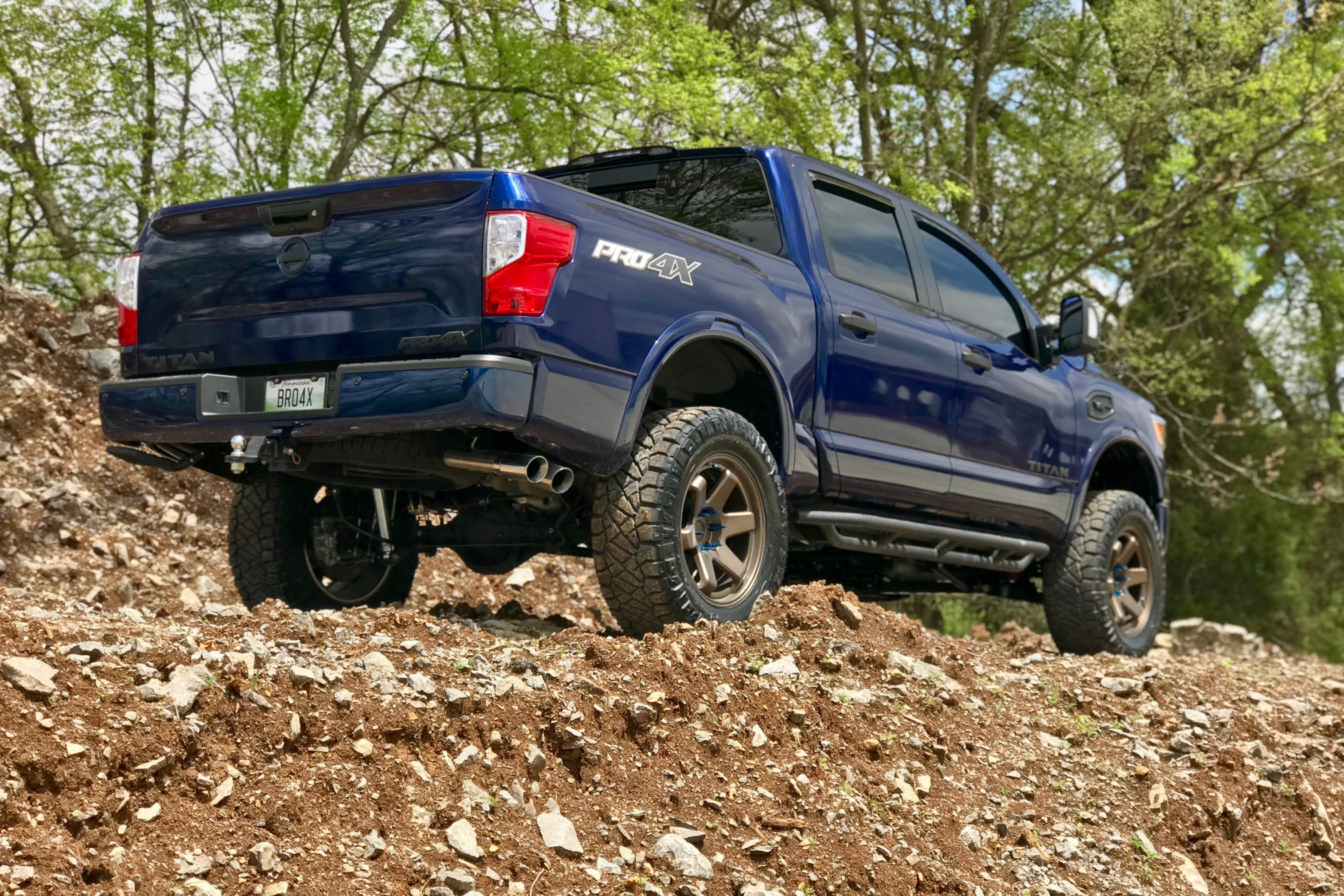Satin Bronze Black Rhino Wheels Add a Touch of Style to Blue Nissan ...