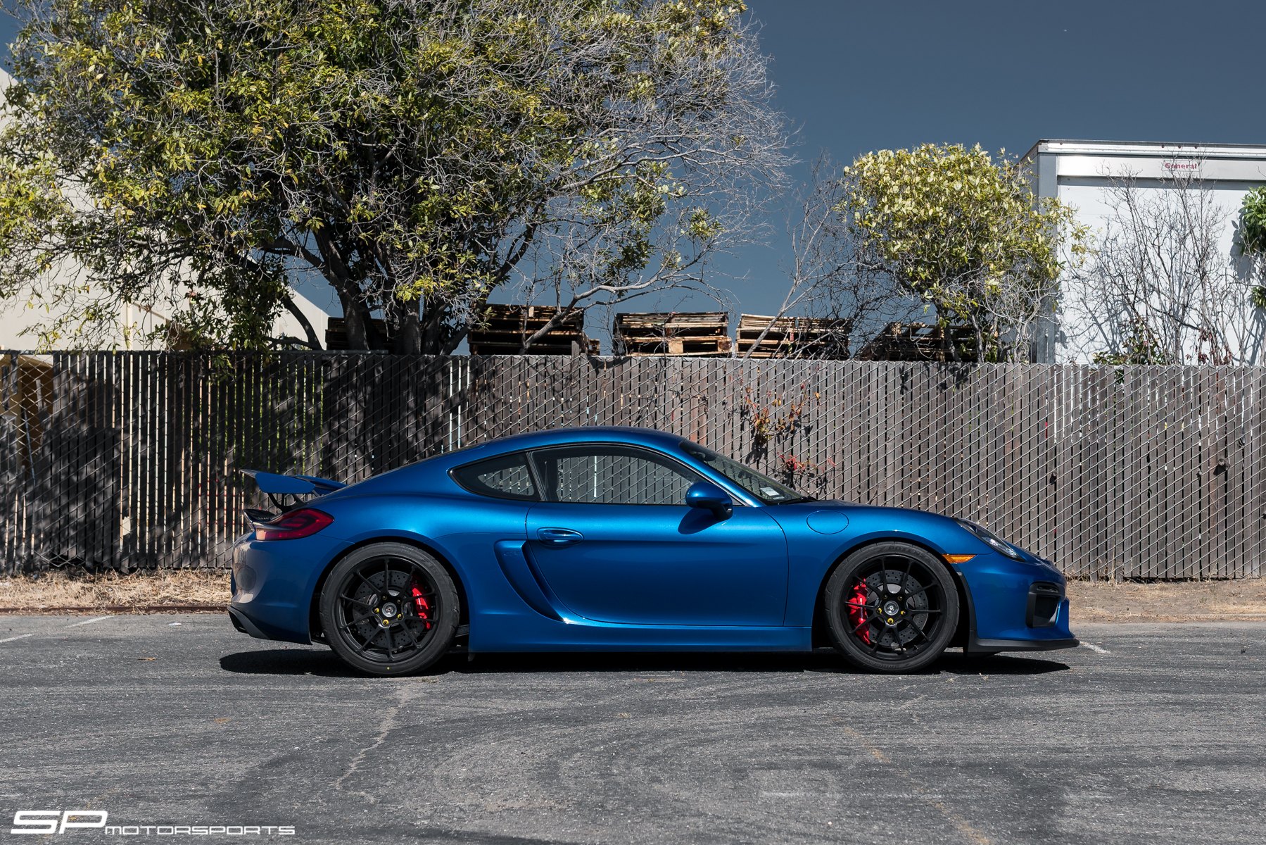 Imposing Blue Cayman, Fitted with Dark Smoke Halo Headlights | CARiD ...