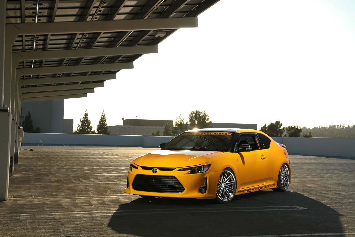 Stanced Blazing yellow Scion TC by Concept One | CARiD.com Gallery