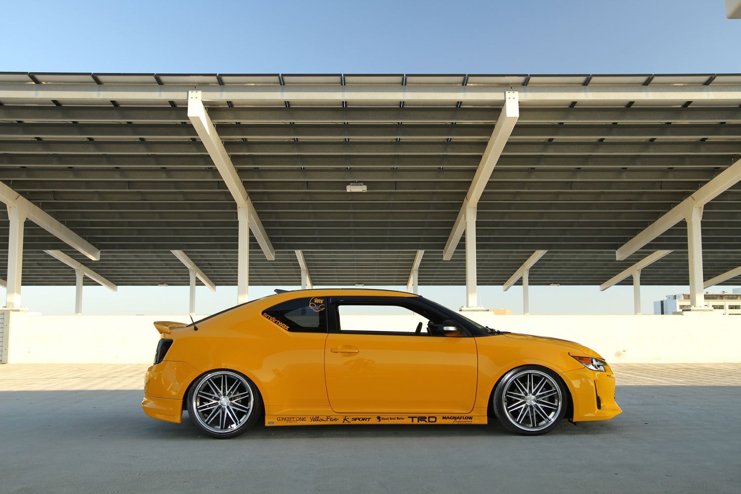 Stanced Blazing yellow Scion TC by Concept One | CARiD.com Gallery