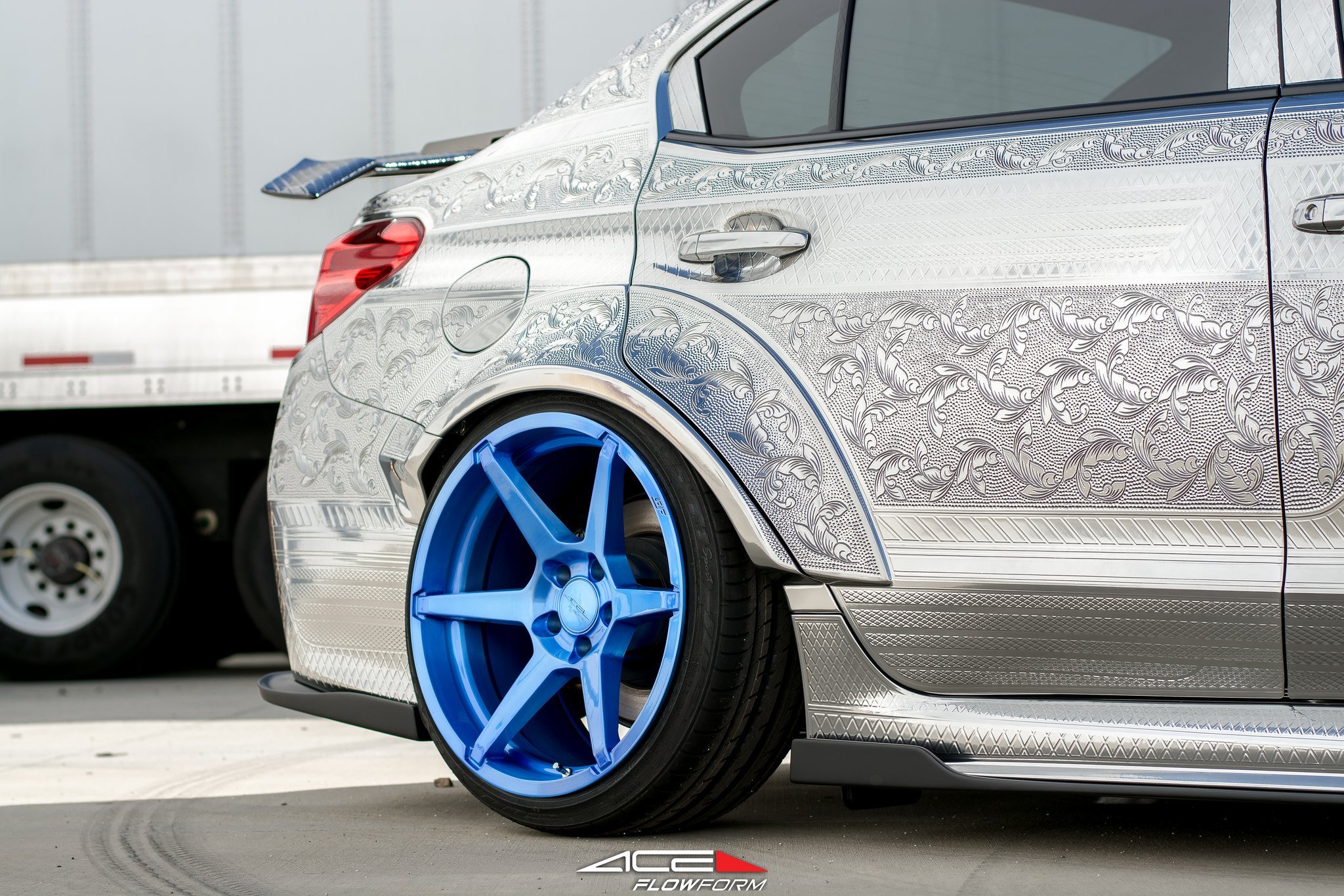 Pure Art - Silver Subaru WRX with Custom Engraving from SEMA | CARiD ...
